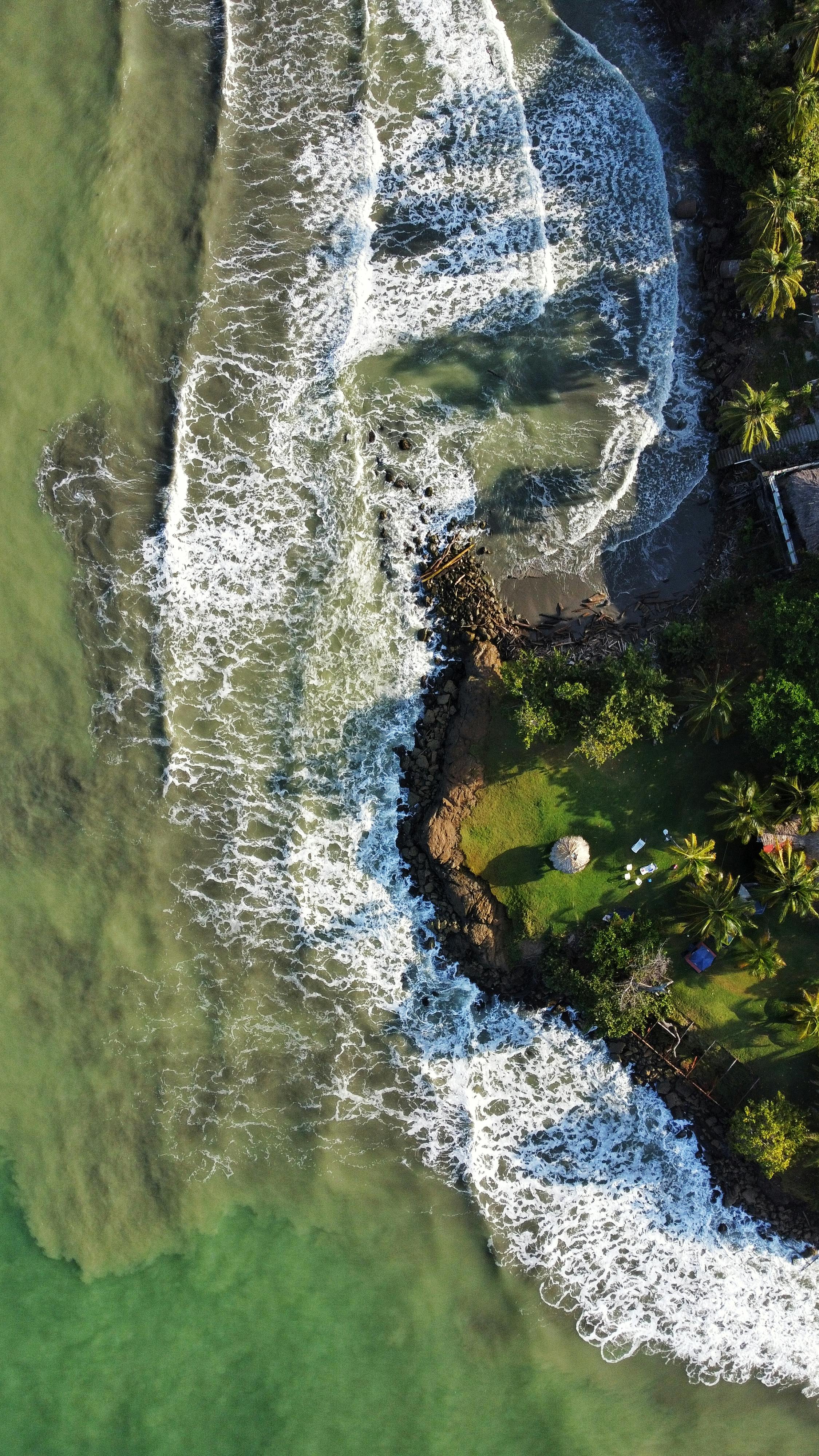 Aerial View of Colombian Coastline with Ocean Waves · Free Stock Photo