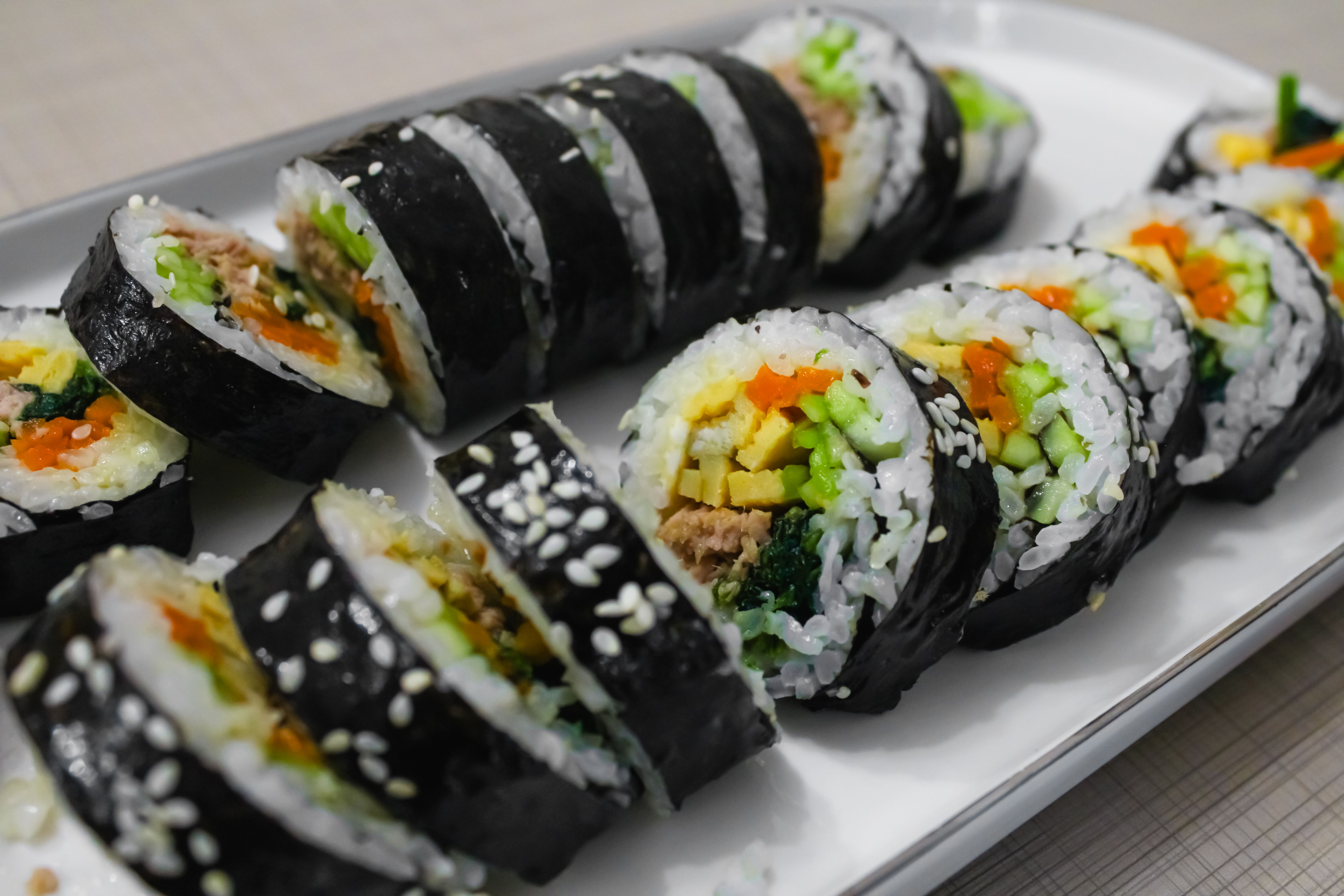 Delicious Korean Gimbap Rolls on Plate · Free Stock Photo