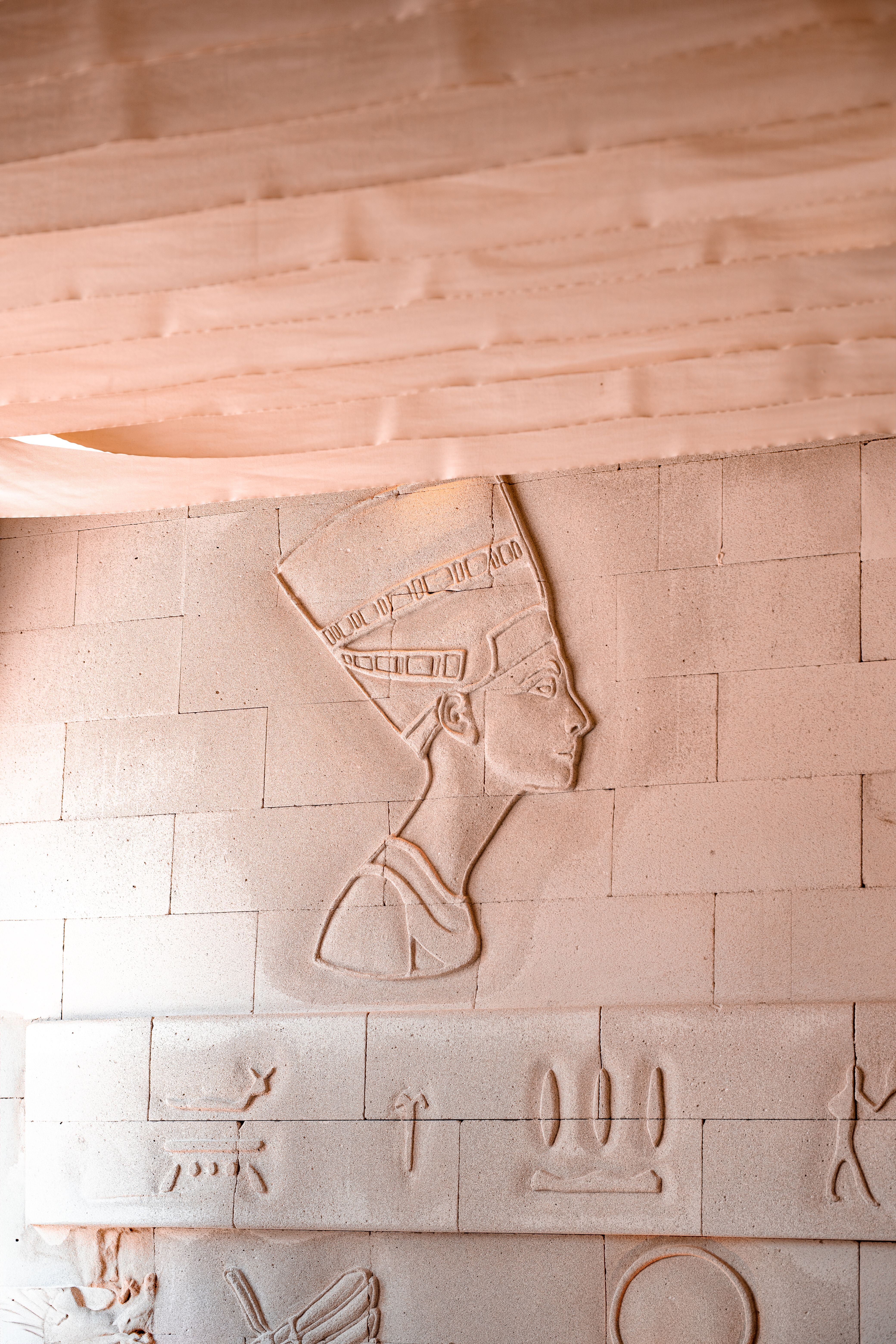 Carved Egyptian Queen Nefertiti Relief on Ancient Wall · Free Stock Photo