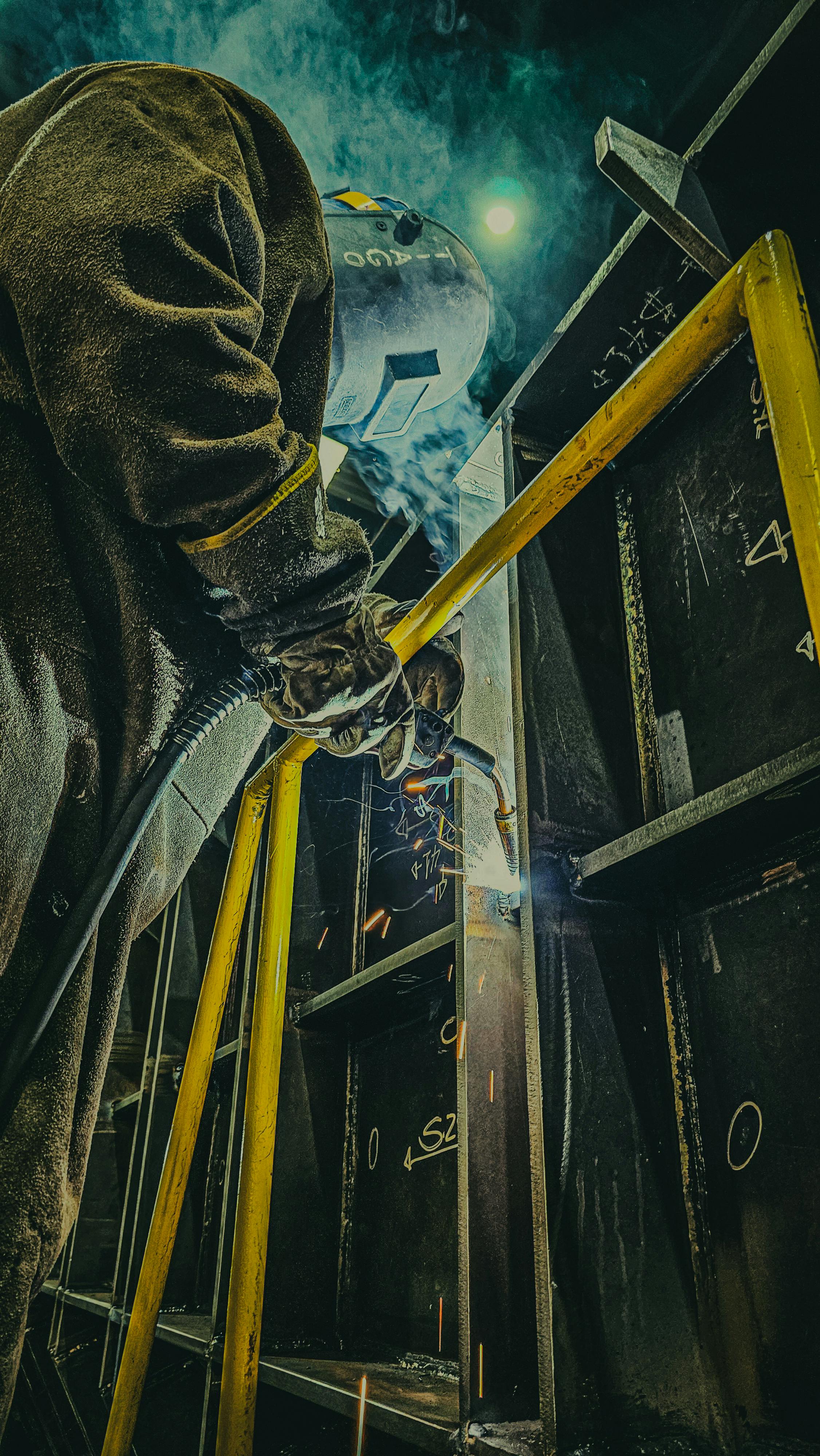 Industrial Welder at Work in Brazilian Factory · Free Stock Photo