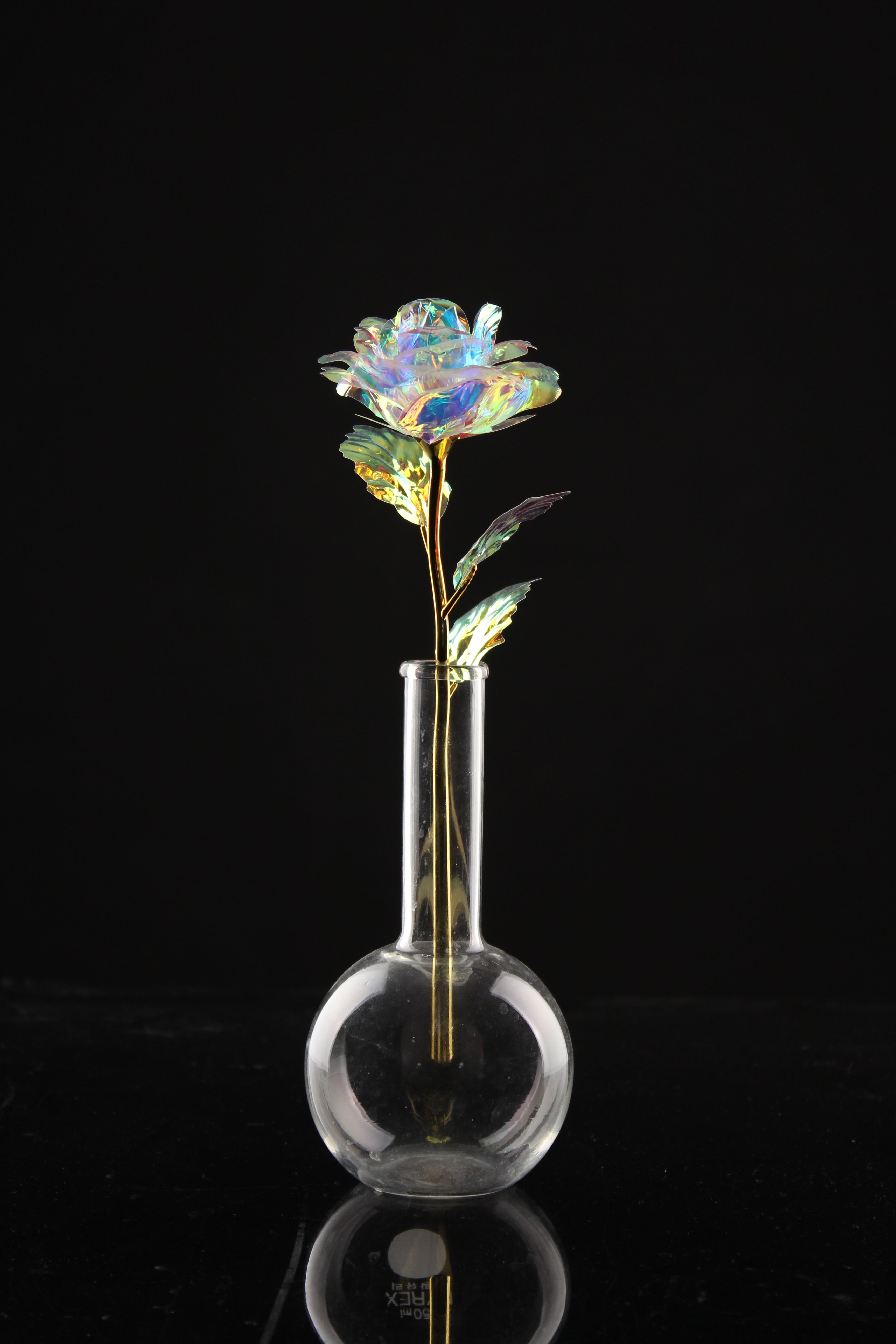 Iridescent Glass Rose in a Clear Carafe · Free Stock Photo