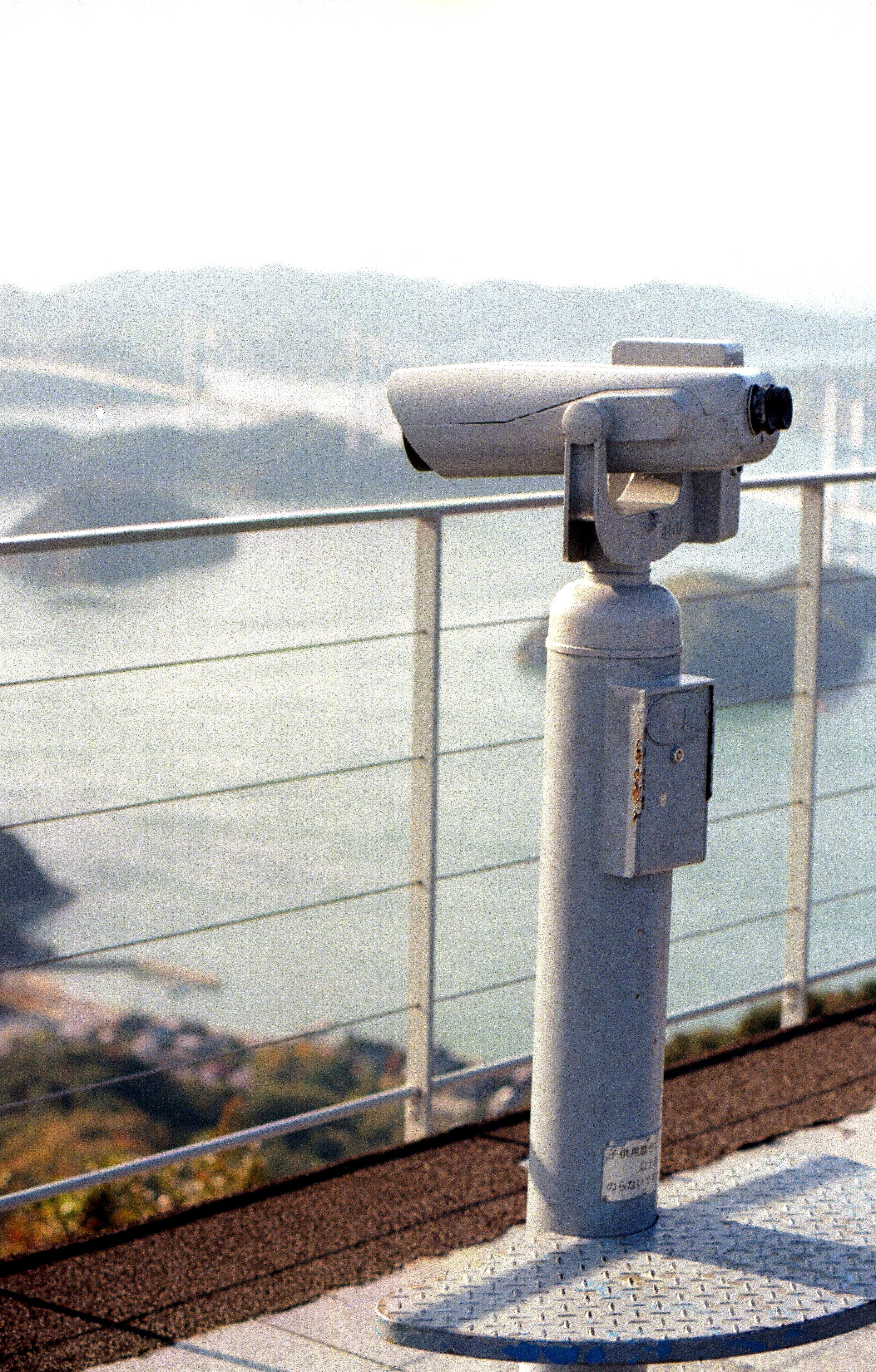 Scenic Viewpoint with Telescope Overlooking Ocean · Free Stock Photo