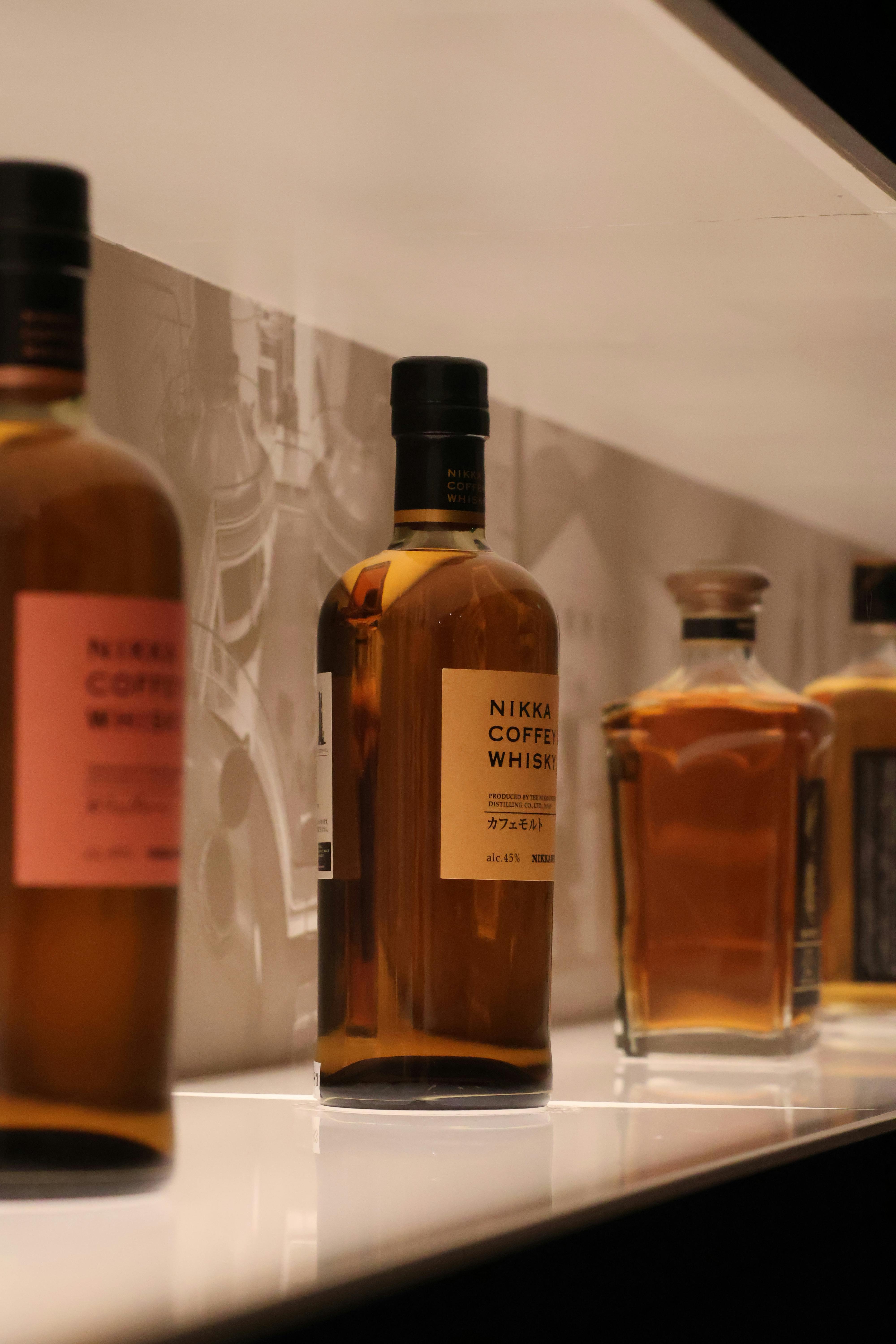 Nikka Coffee Whisky Bottles on Display Shelf · Free Stock Photo