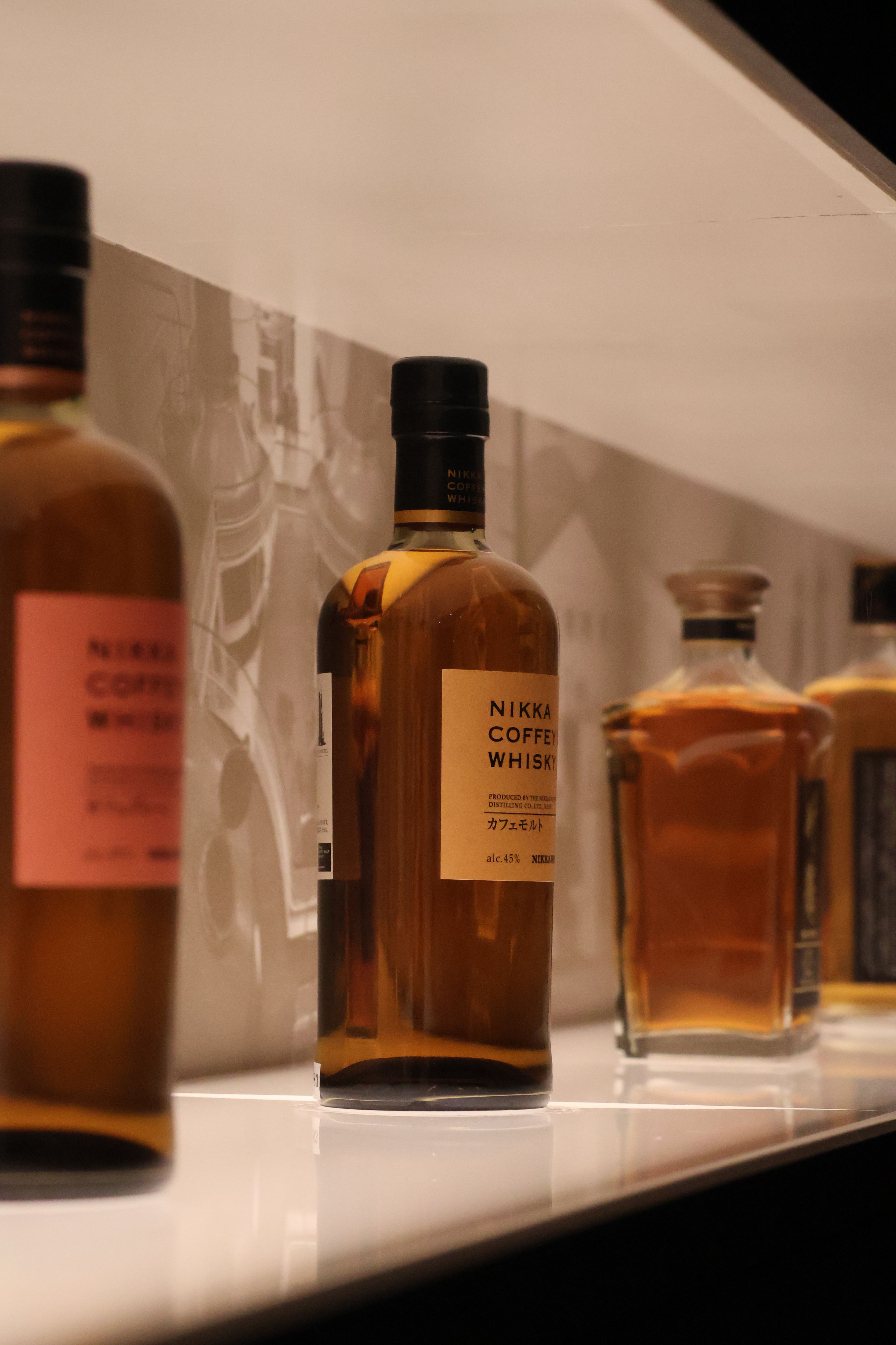 Nikka Coffee Whisky Bottles on Display Shelf · Free Stock Photo