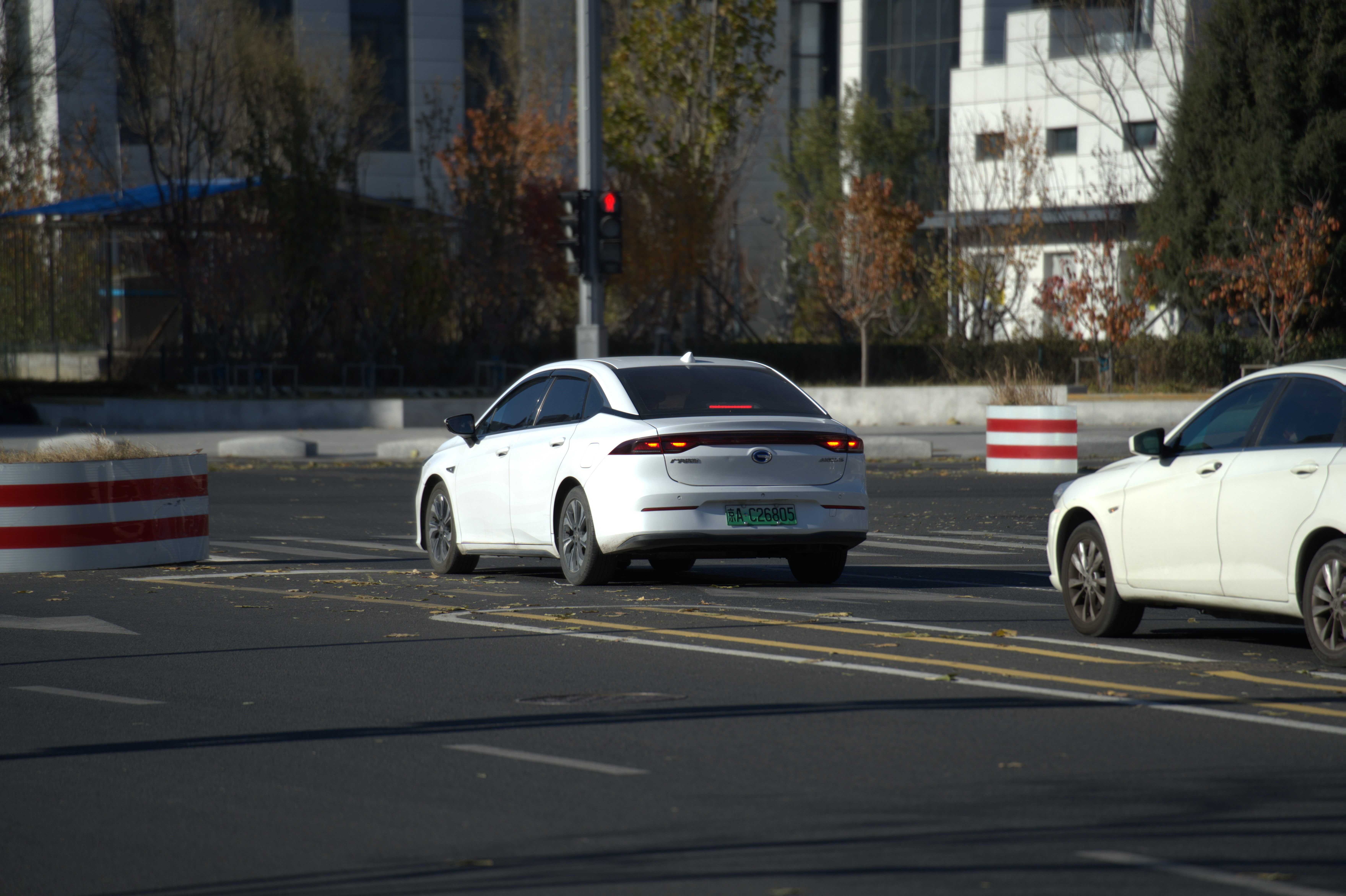 White cars on urban street during sunny day · Free Stock Photo