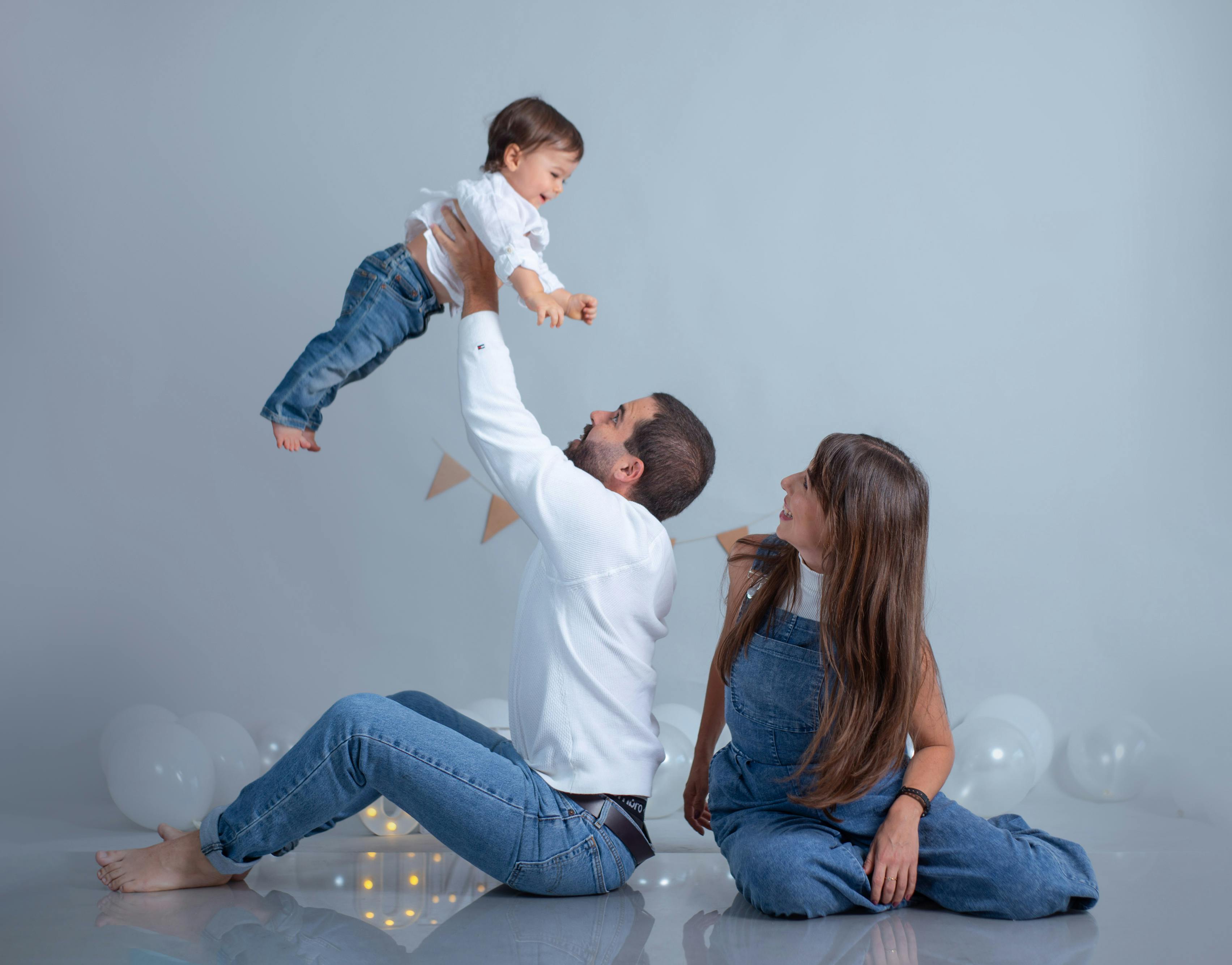Happy Family Enjoying Indoor Playtime · Free Stock Photo
