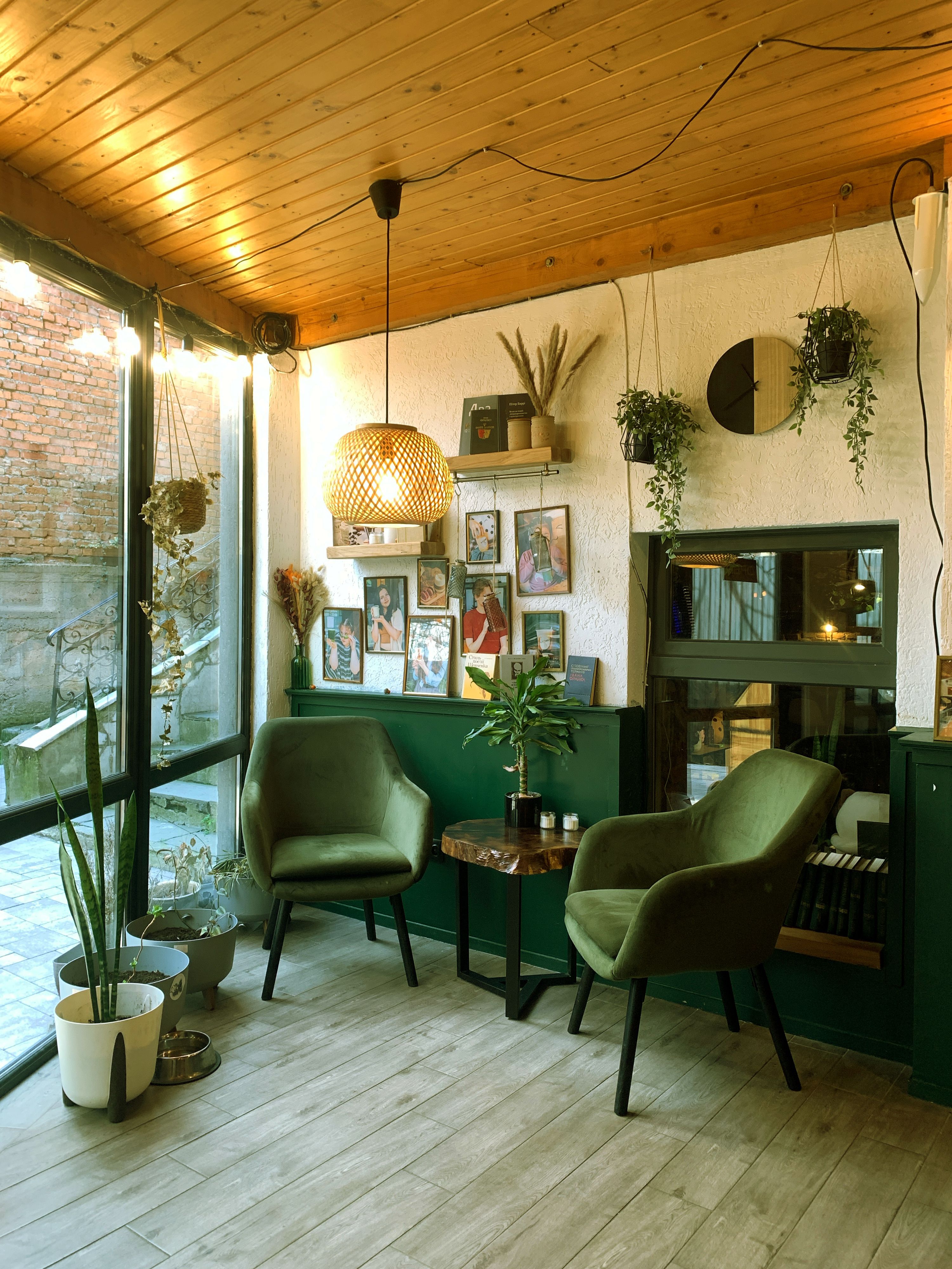 Cozy Modern Cafe Corner with Indoor Plants · Free Stock Photo
