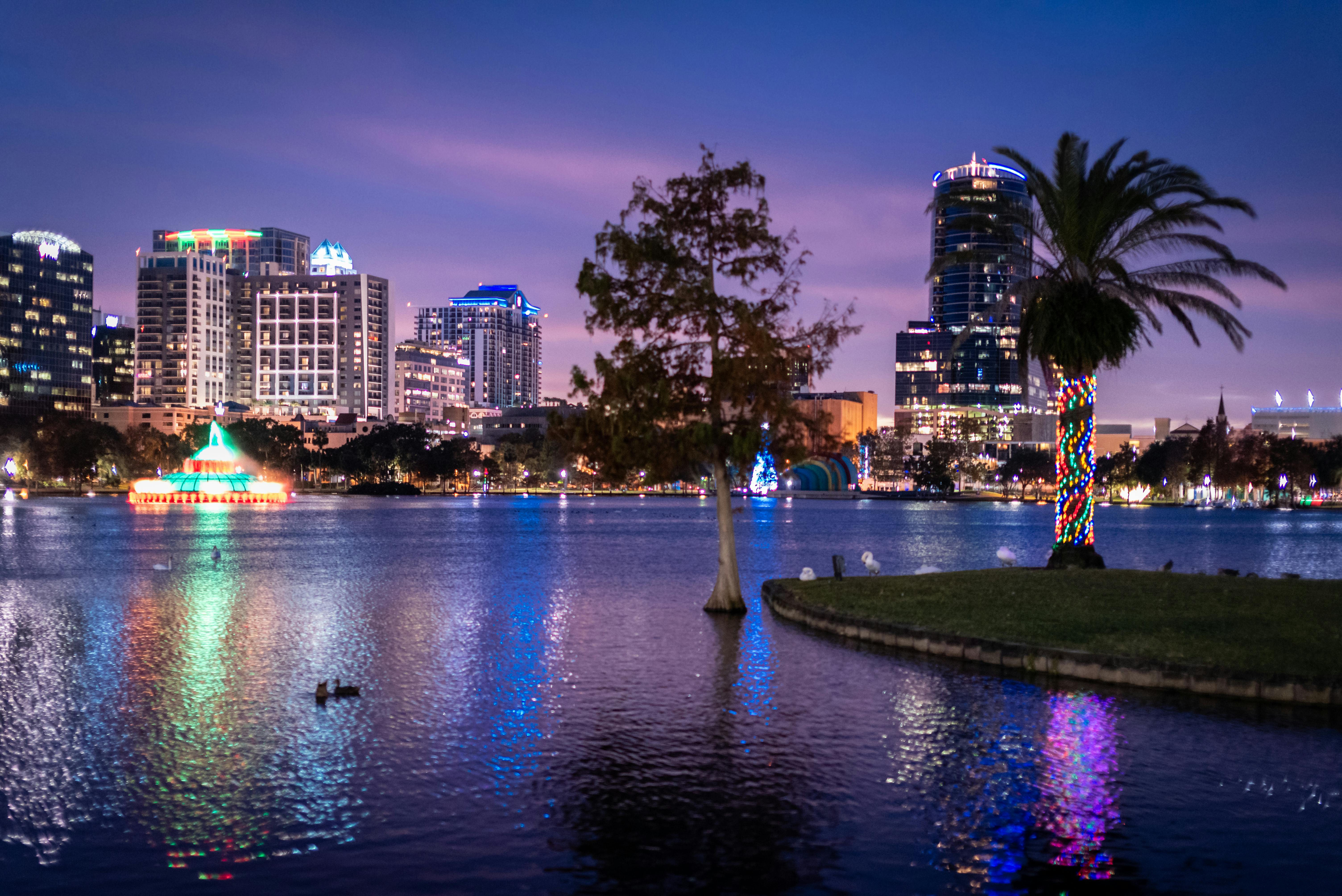Orlando Cityscape at Twilight with Lake Eola · Free Stock Photo