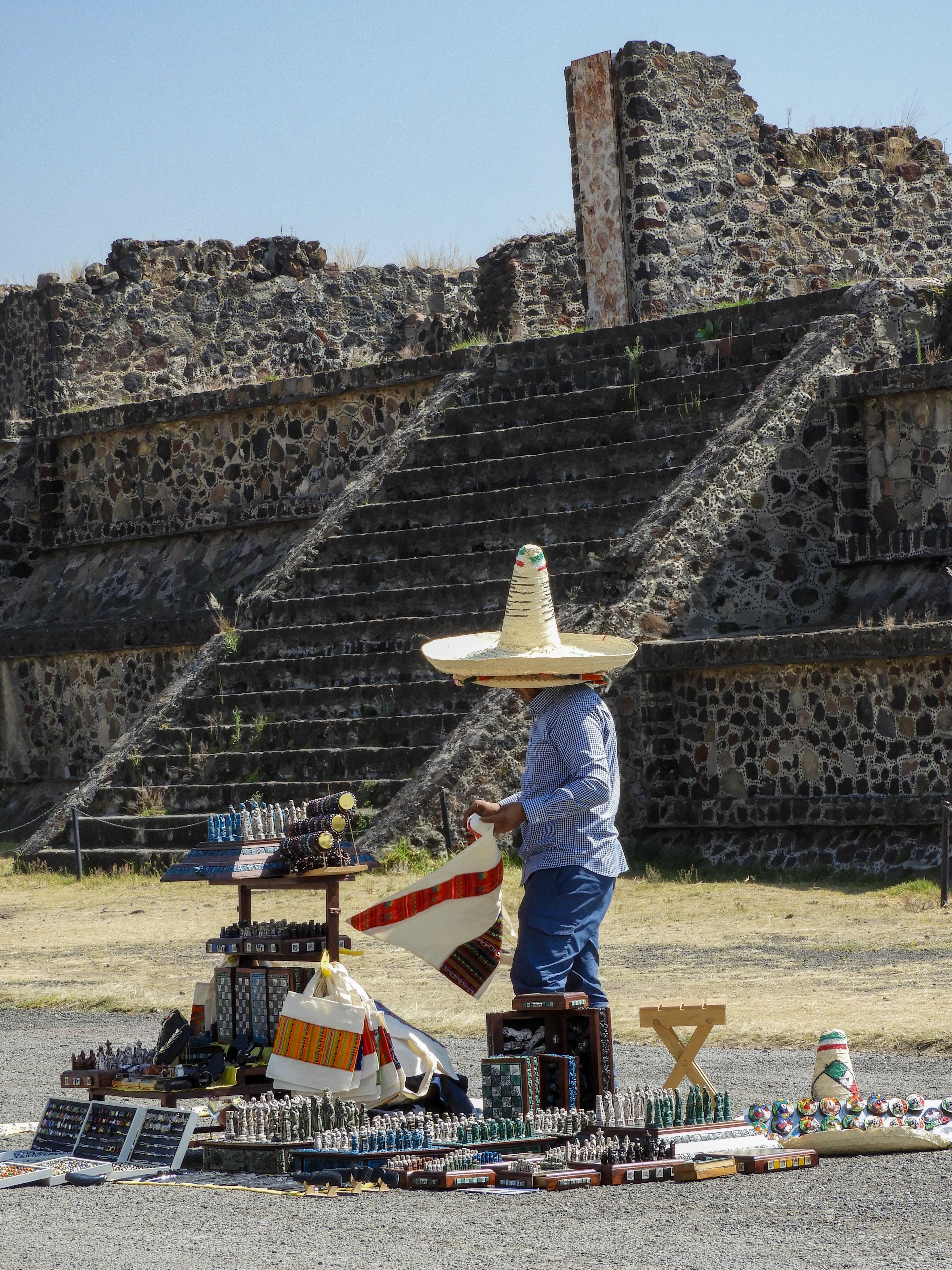 Vendor at Teotihuacán Pyramid Selling Souvenirs · Free Stock Photo