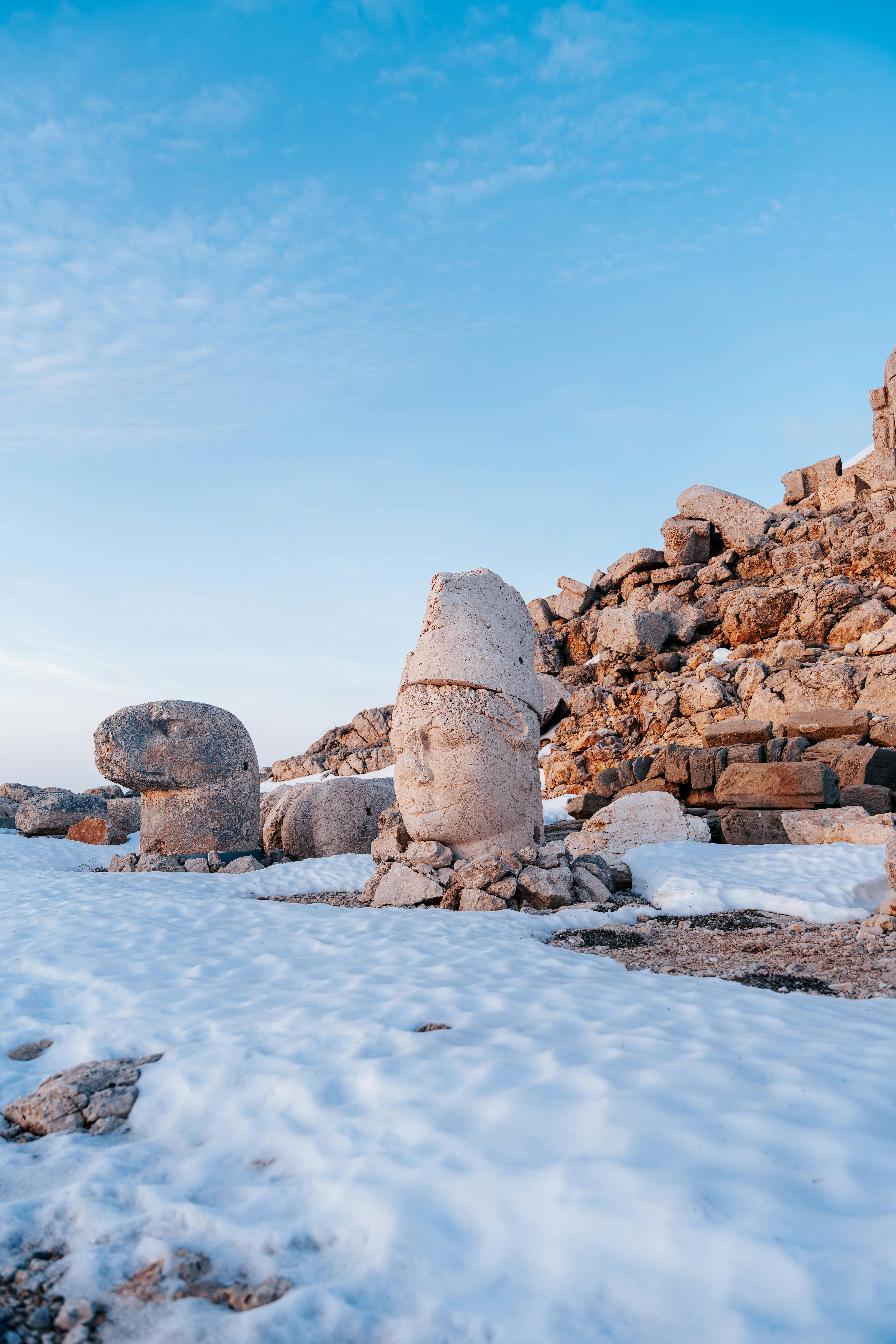 Ancient Statues on Snowy Mount Nemrut · Free Stock Photo