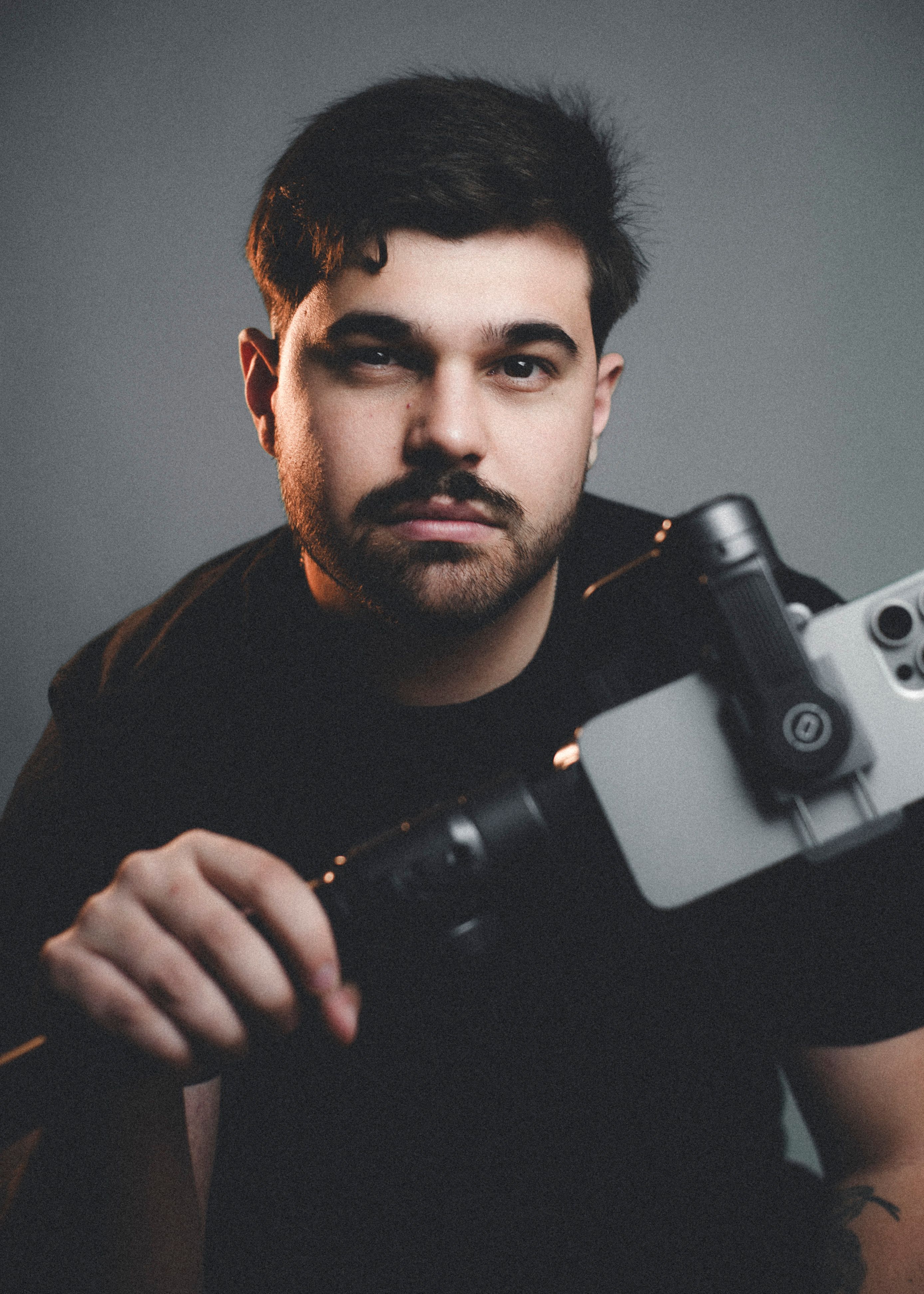 Portrait of Male Photographer with Camera Equipment · Free Stock Photo