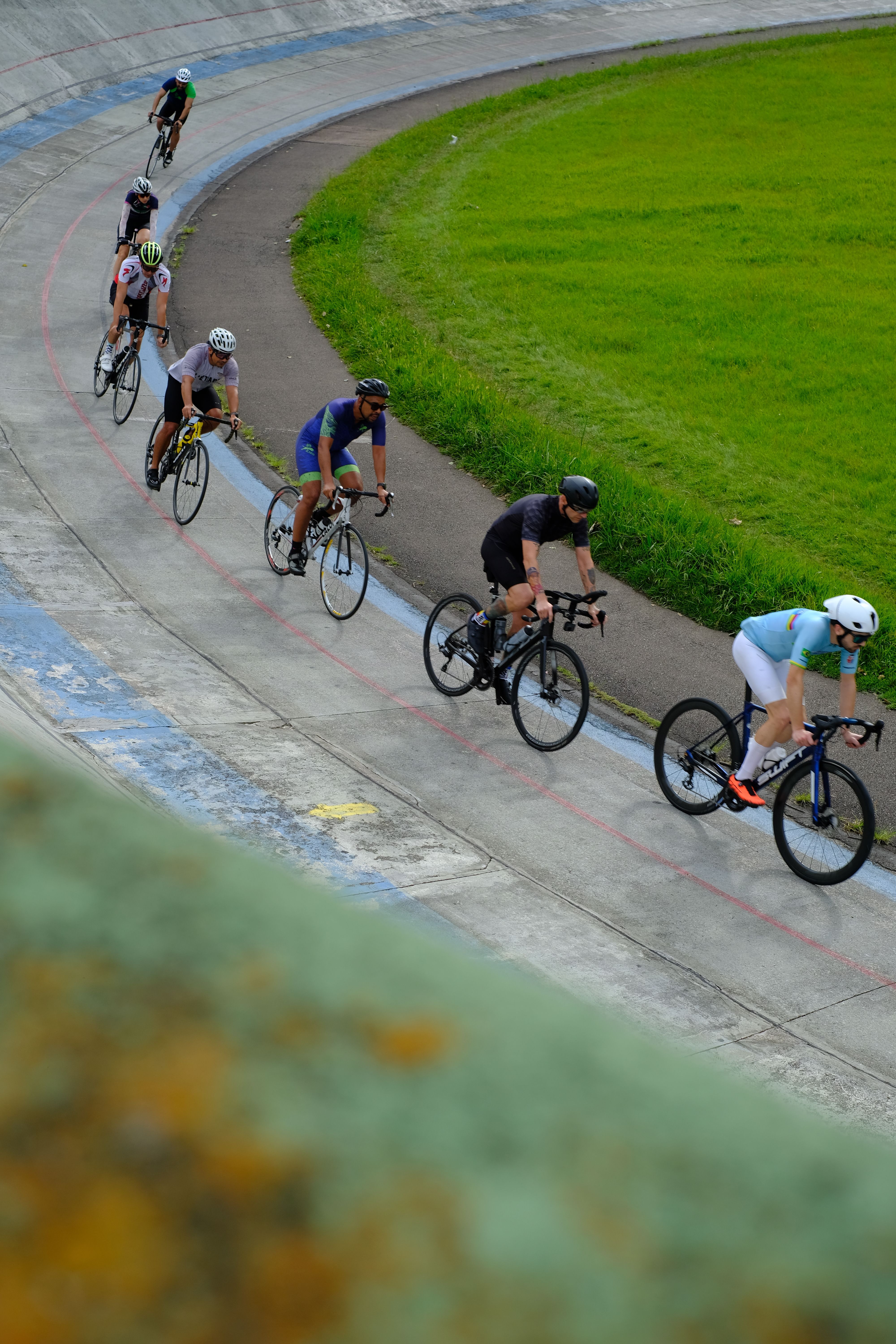Cyclists Racing on Velodrome Track in Curitiba · Free Stock Photo
