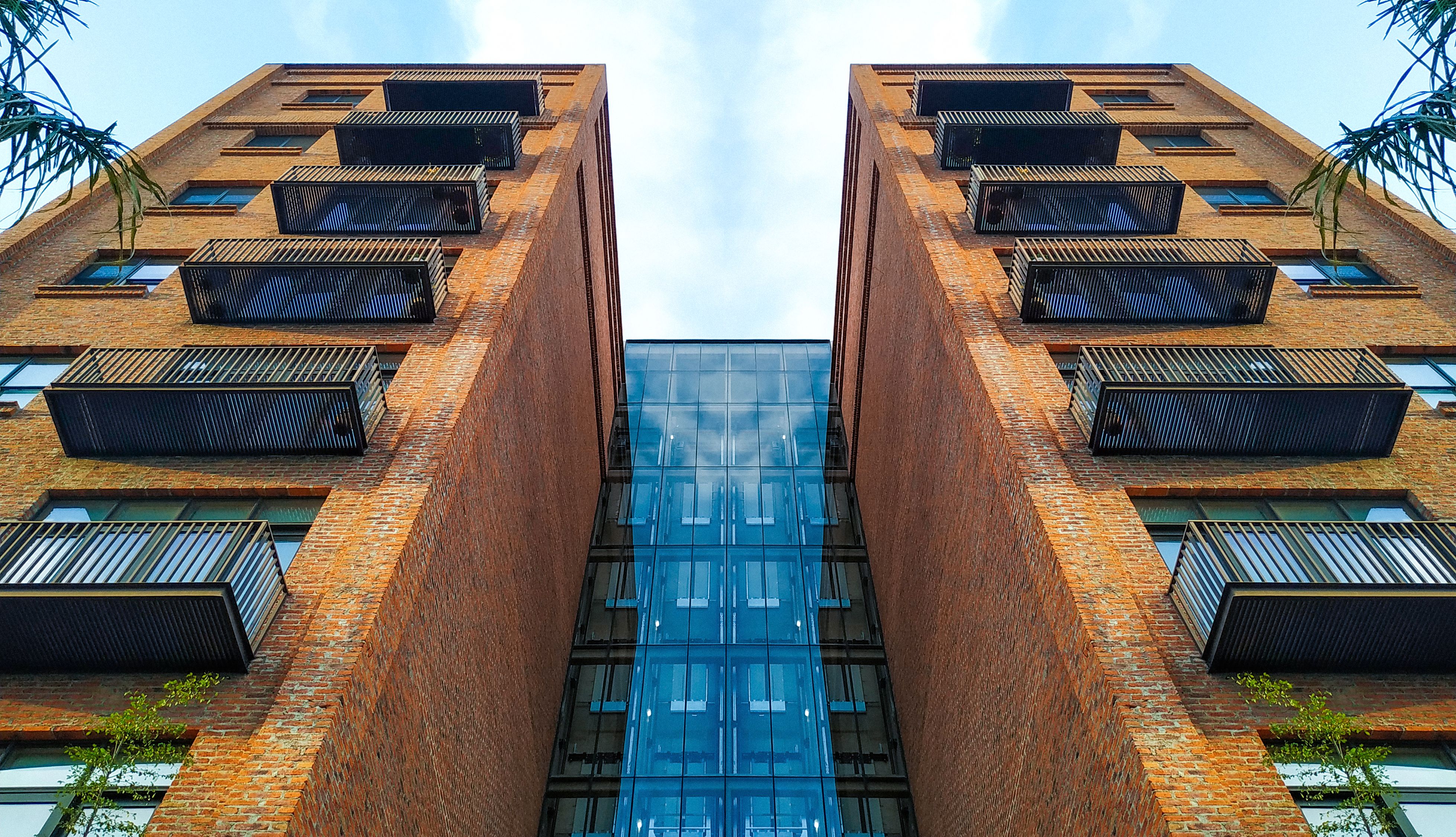 Modern Brick Building with Glass Architecture · Free Stock Photo