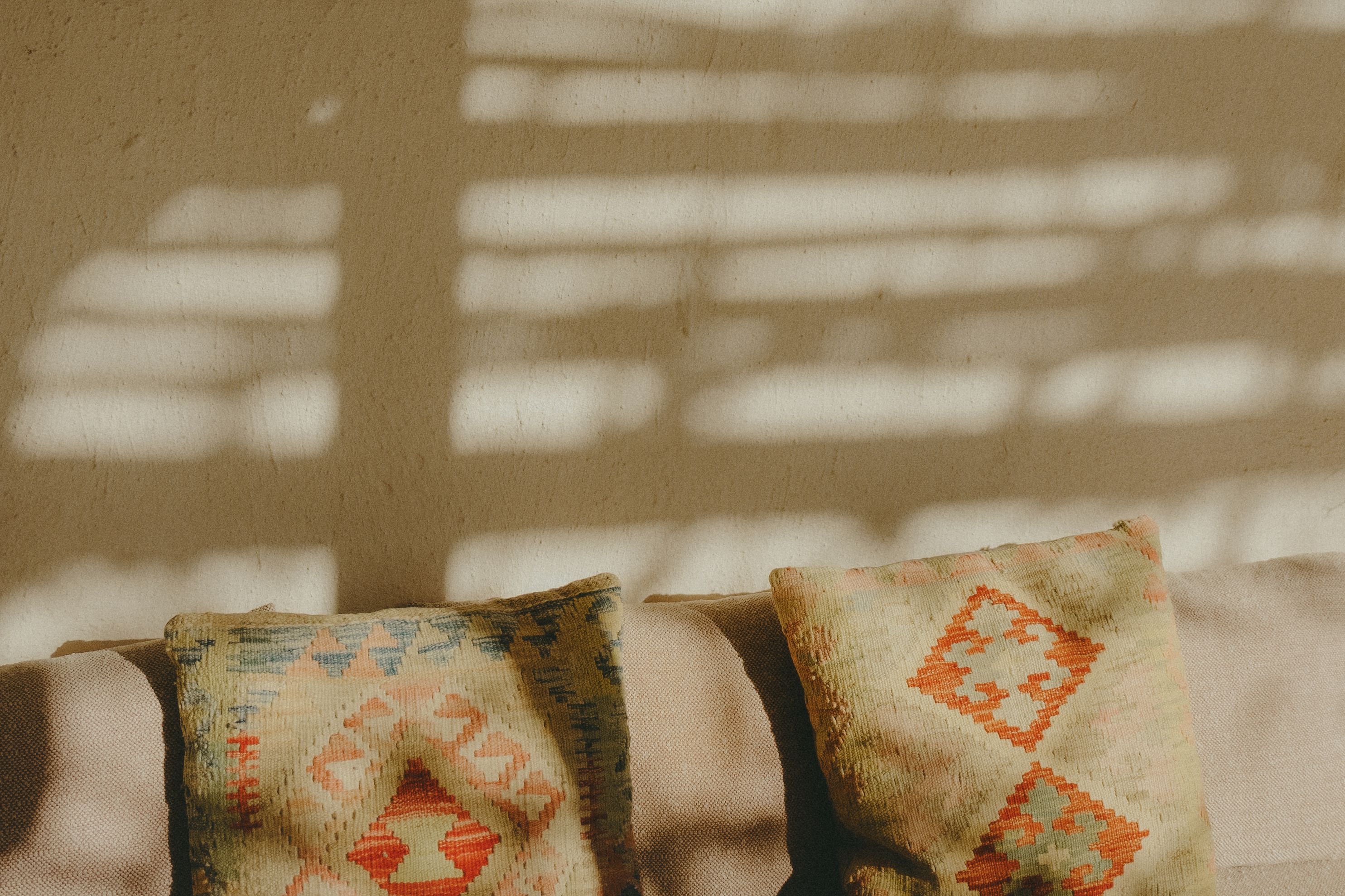 Warm Moroccan Sunlight on Traditional Cushions · Free Stock Photo