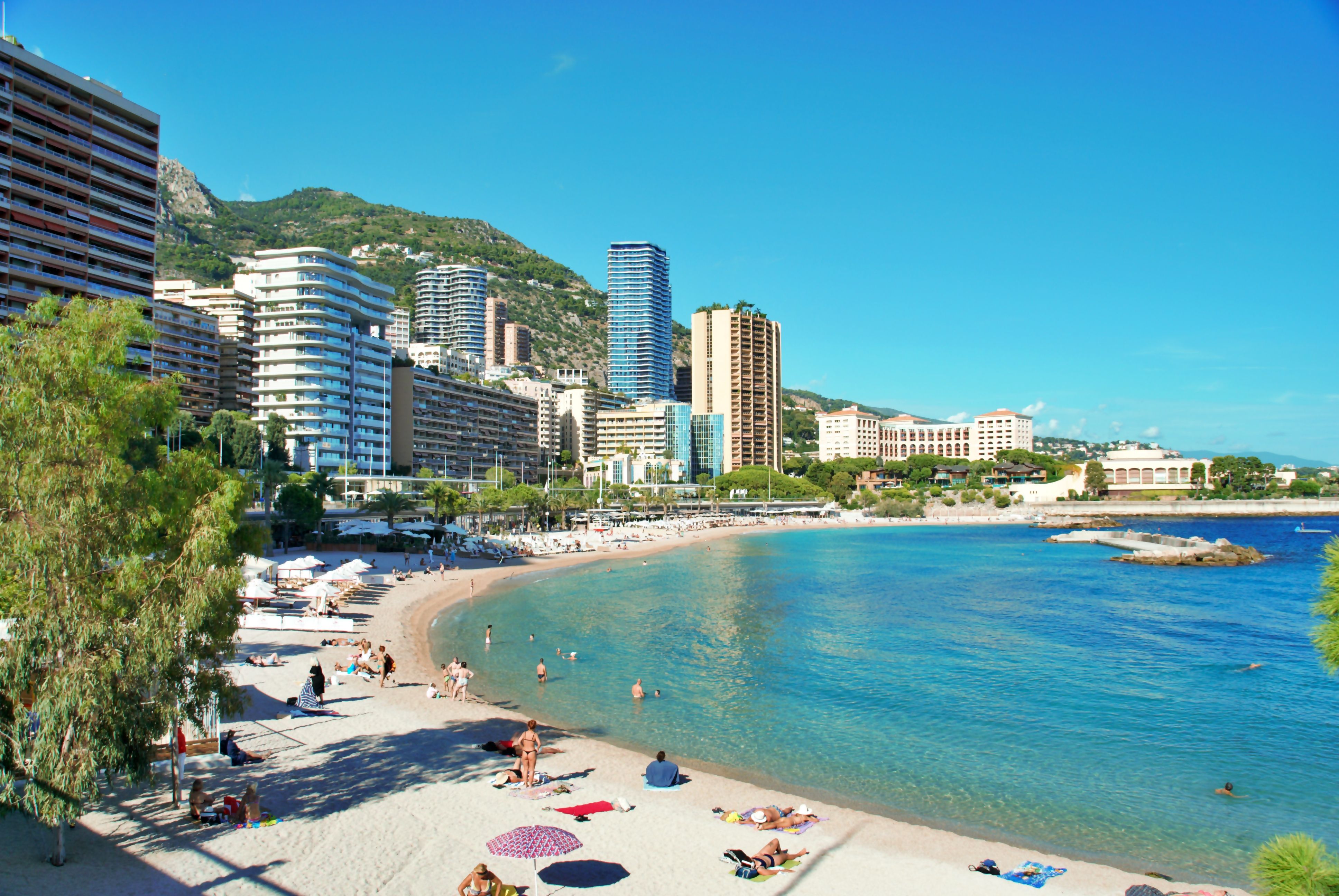 Sunny Beachfront with Monaco Skyline · Free Stock Photo