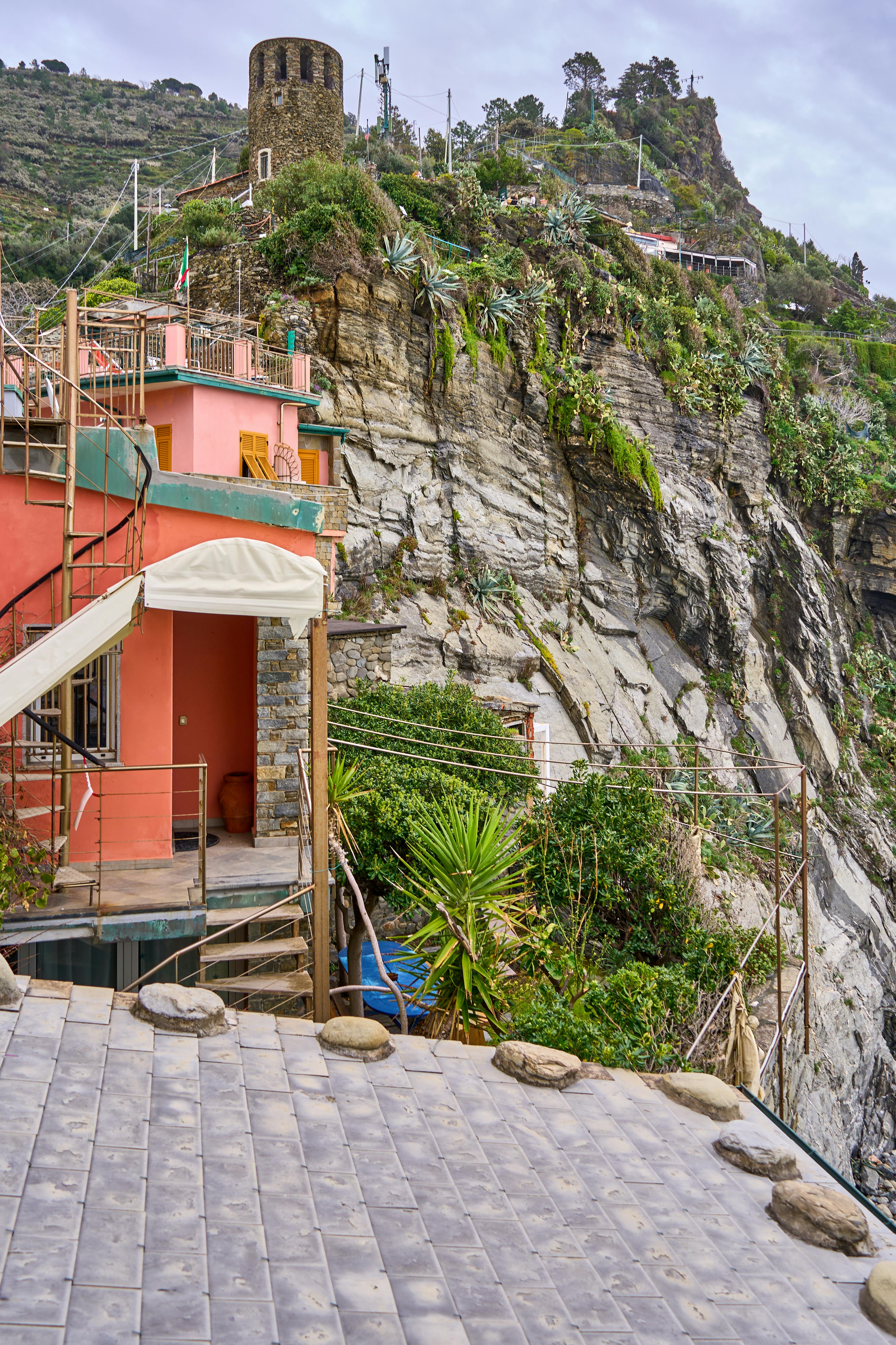 A Couple Looking at the Houses on the Cliff in Cinque Terre, Italy ...