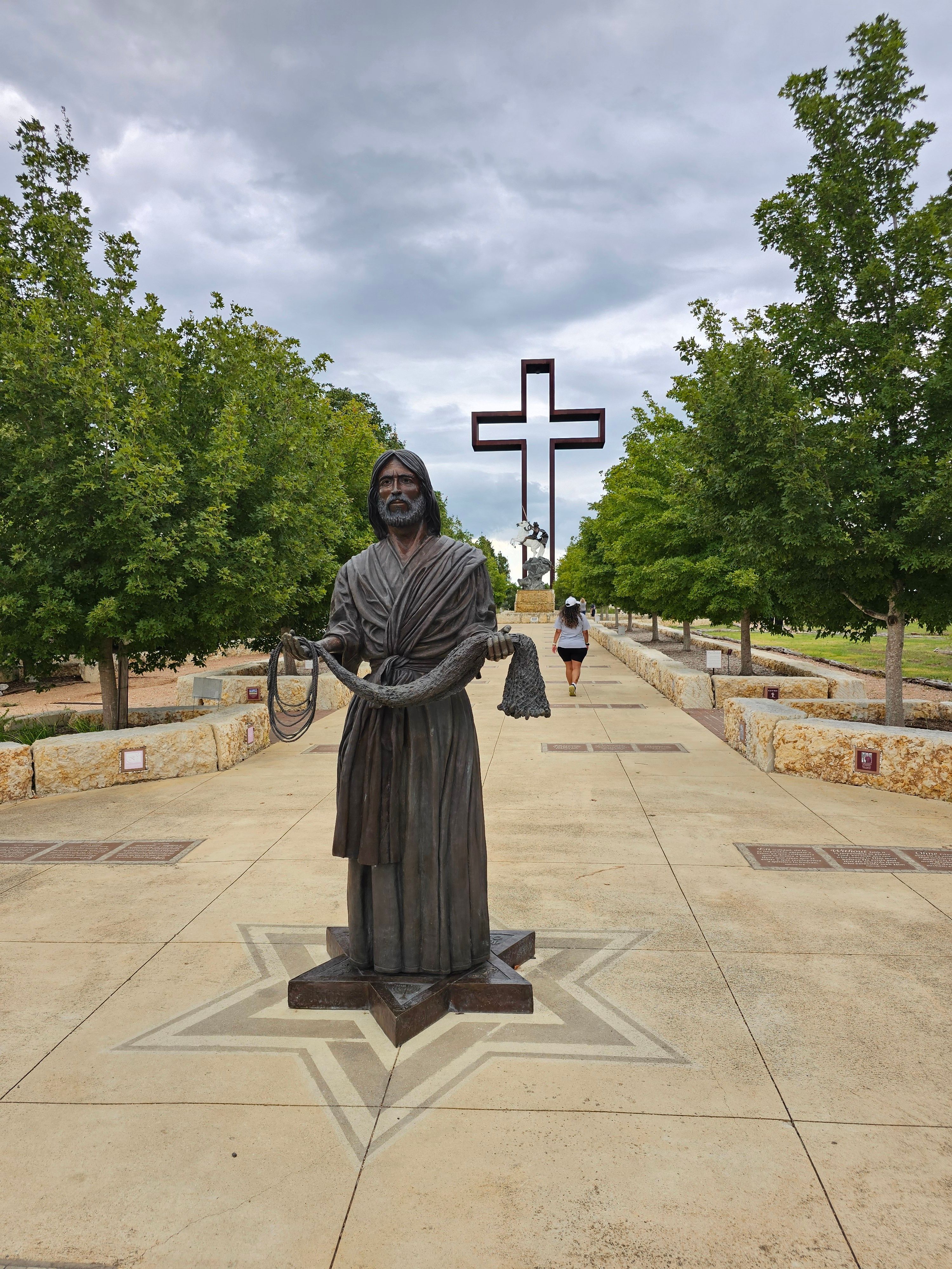 Statue and Cross Pathway in Religious Park · Free Stock Photo
