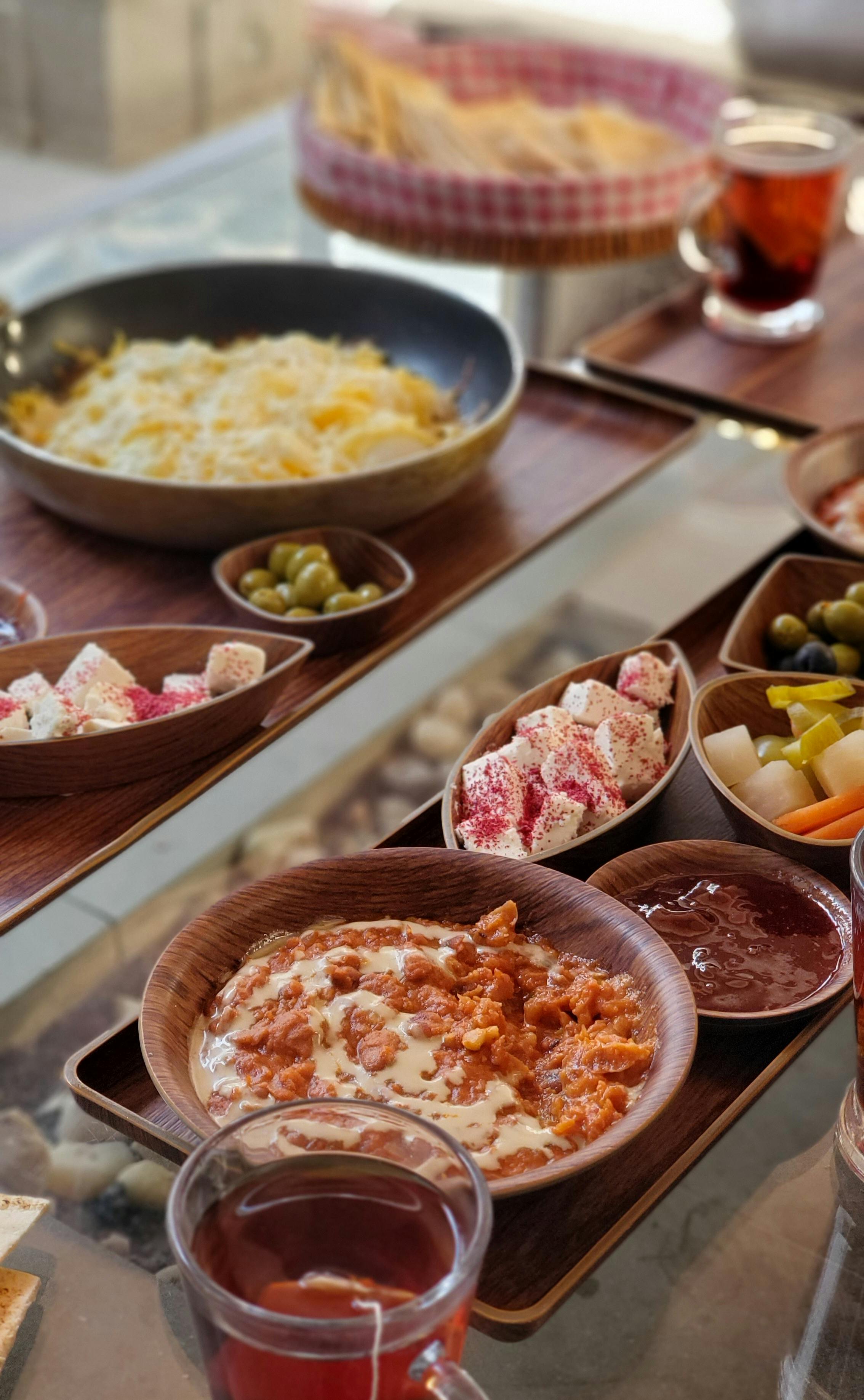 Traditional Yemeni Breakfast Spread with Tea · Free Stock Photo