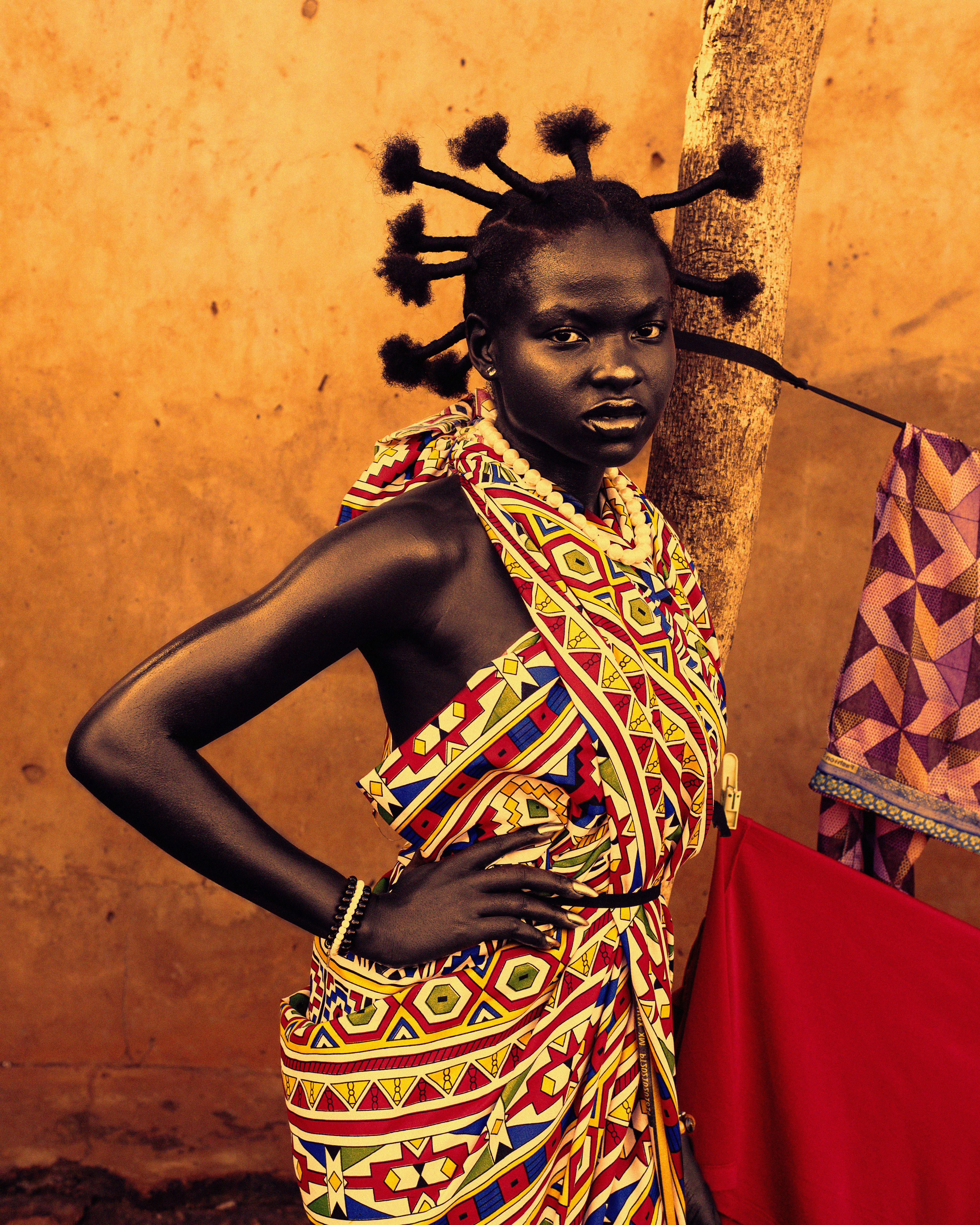 Traditional African Attire and Hairstyle Portrait · Free Stock Photo