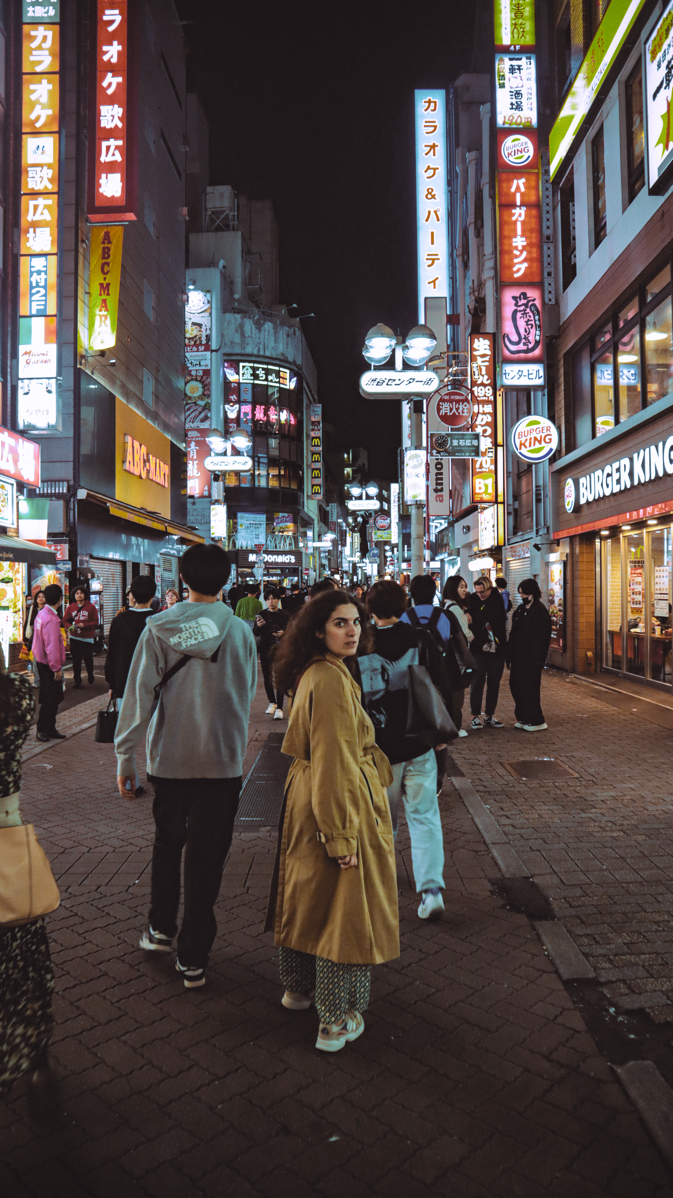 Bustling Tokyo Night Street Scene with Neon Lights · Free Stock Photo