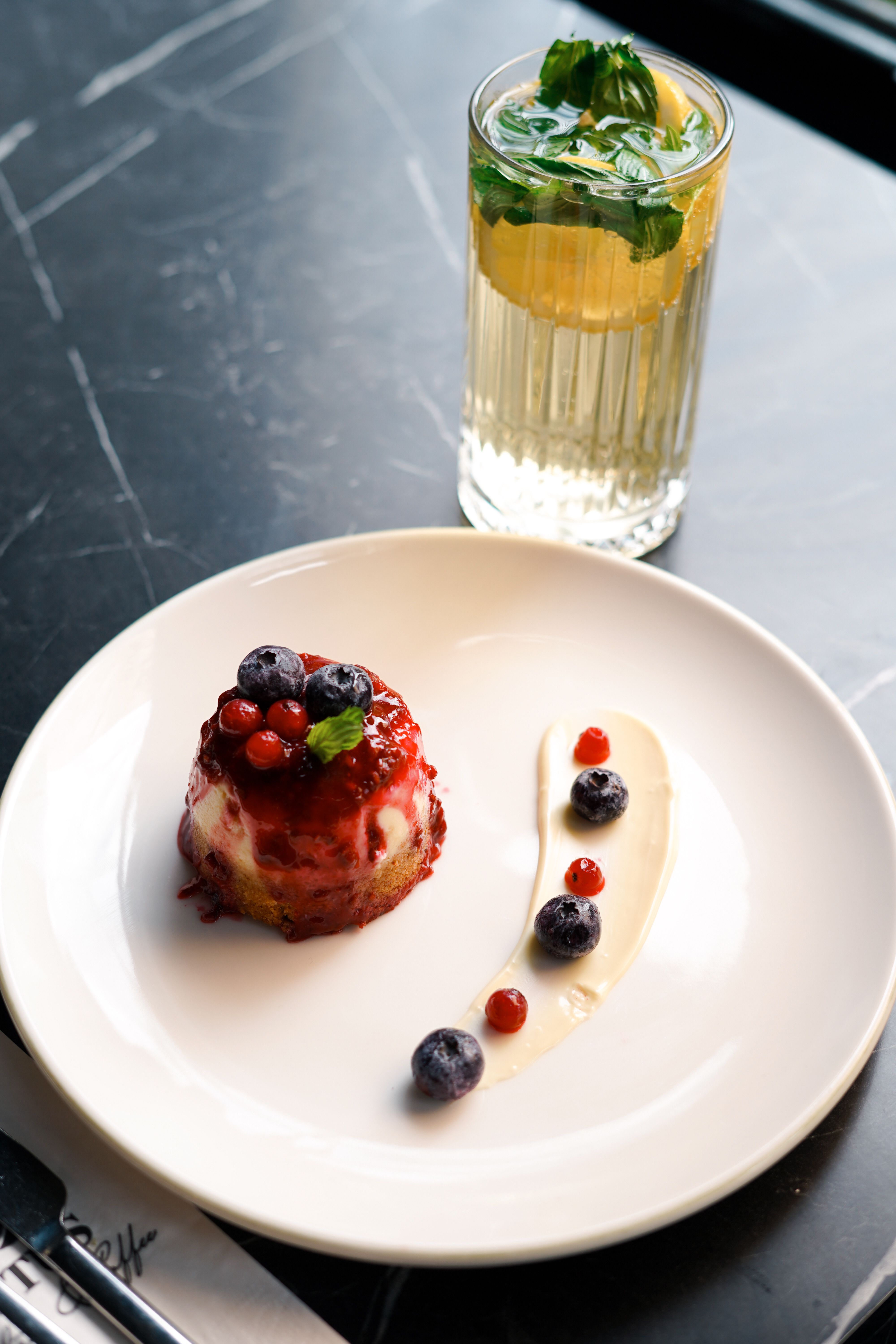 Elegant Dessert Plating with Refreshing Drink · Free Stock Photo