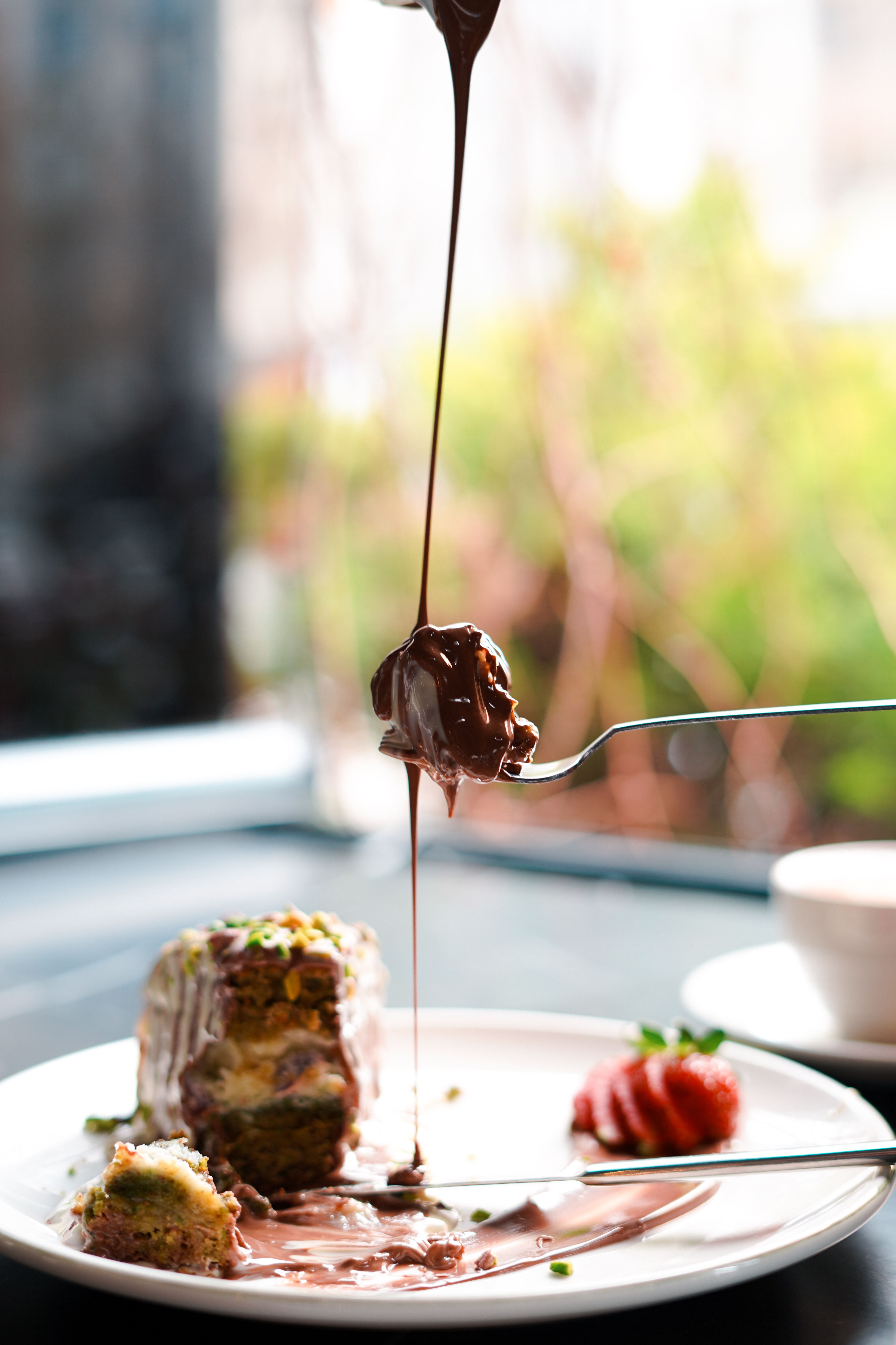 Delicious Dessert with Dripping Chocolate Sauce · Free Stock Photo