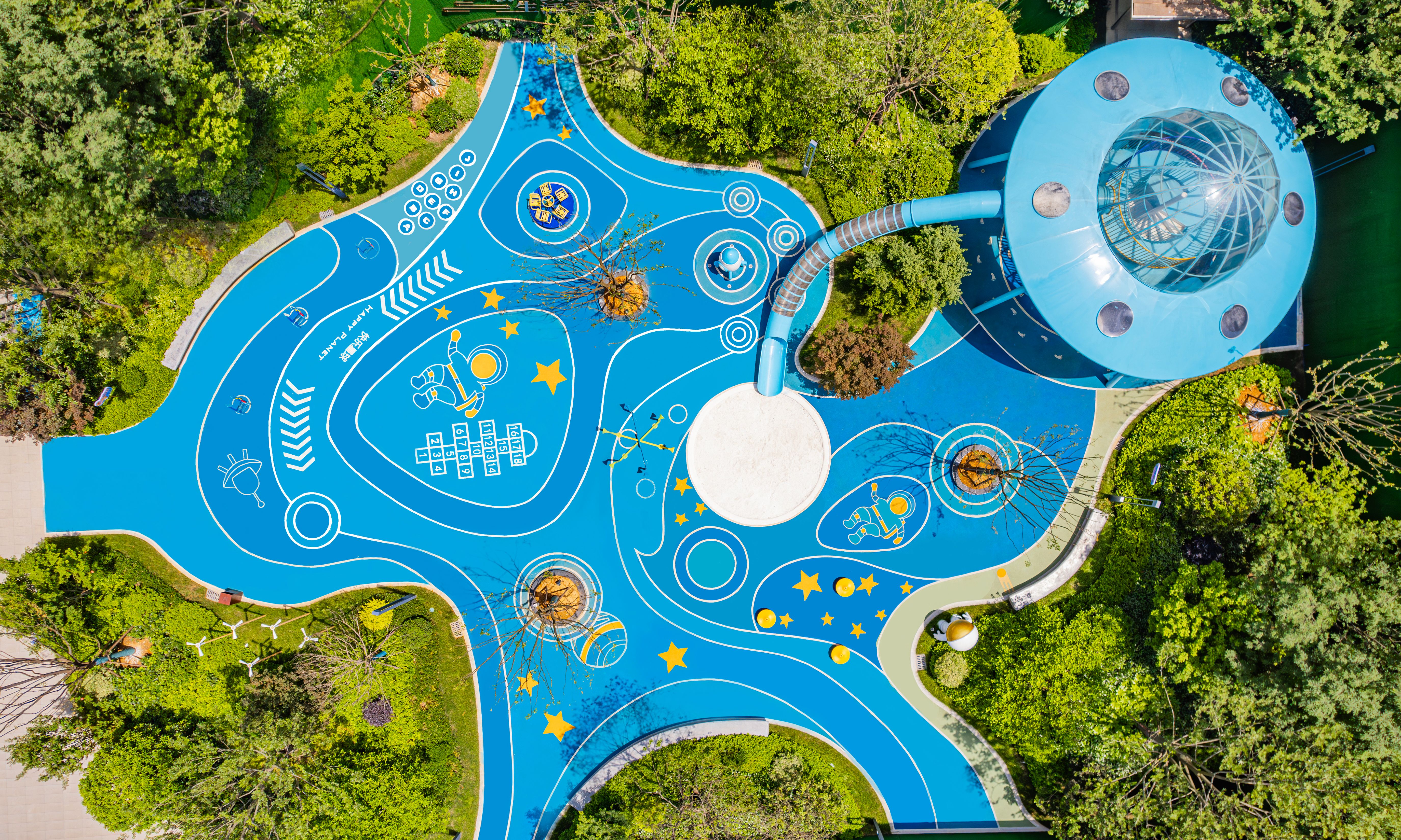 Aerial View of Colorful Space-Themed Playground · Free Stock Photo