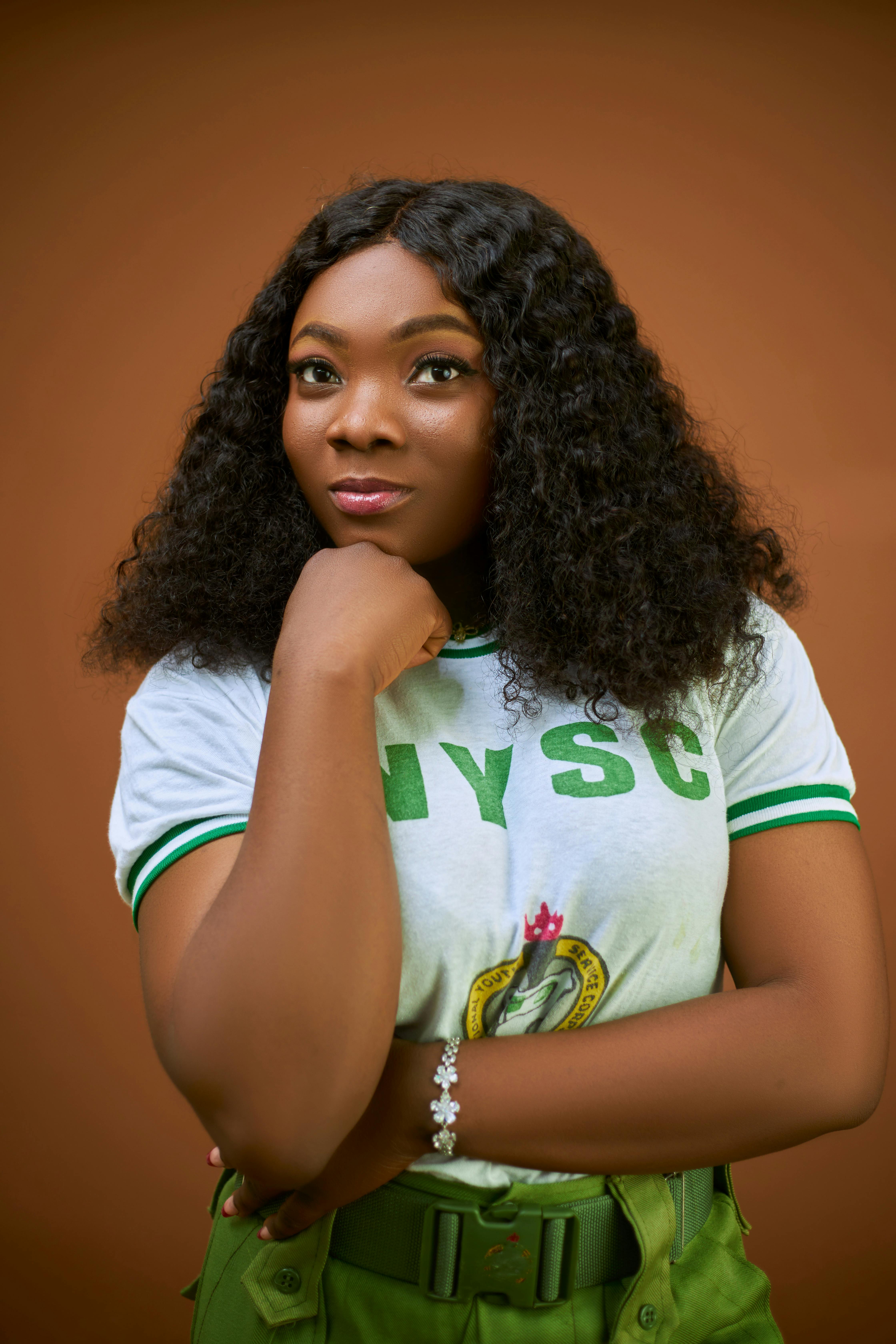 Confident Woman in NYSC Uniform Portrait · Free Stock Photo