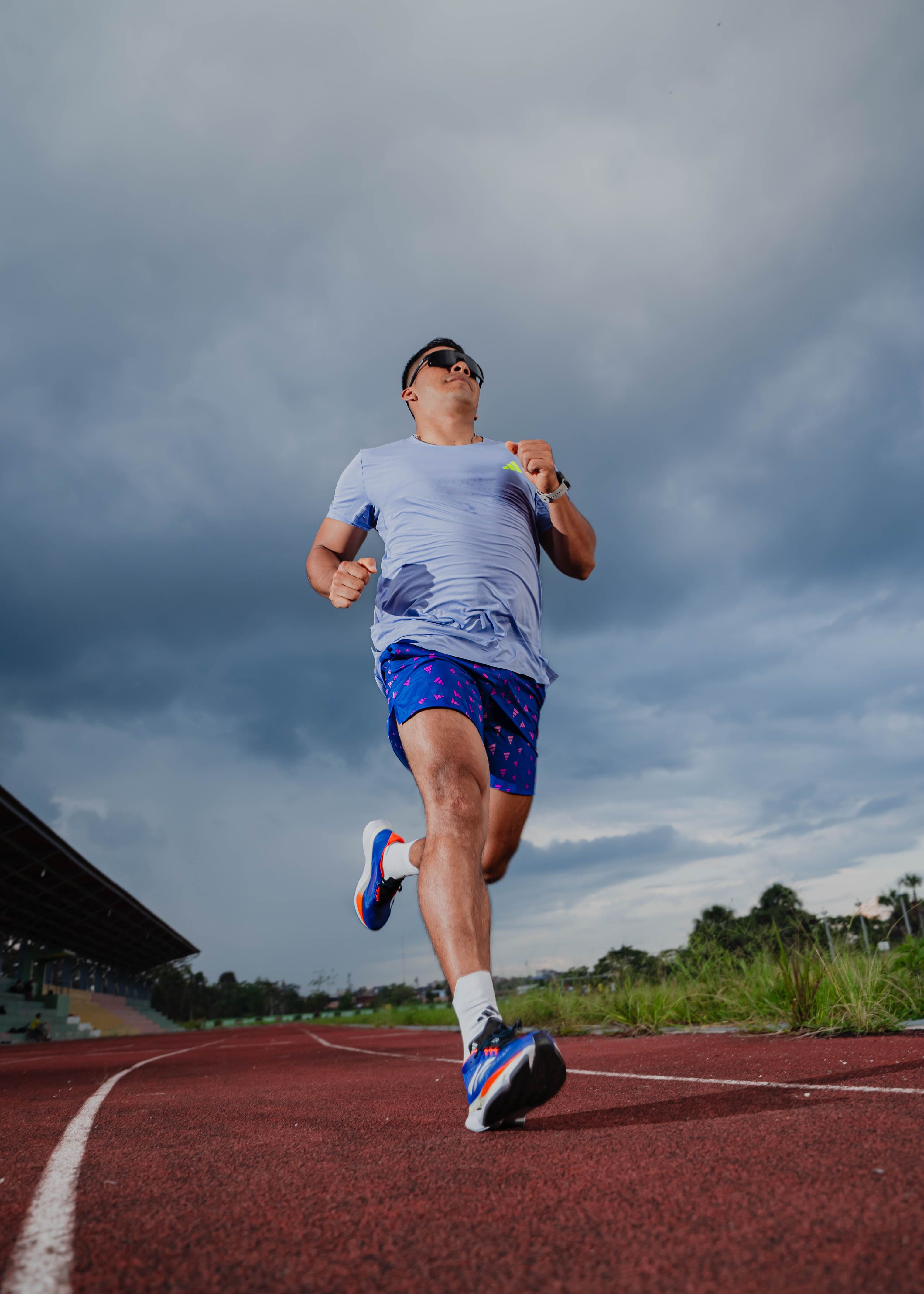 Athletic Man Running on Track in Peru · Free Stock Photo