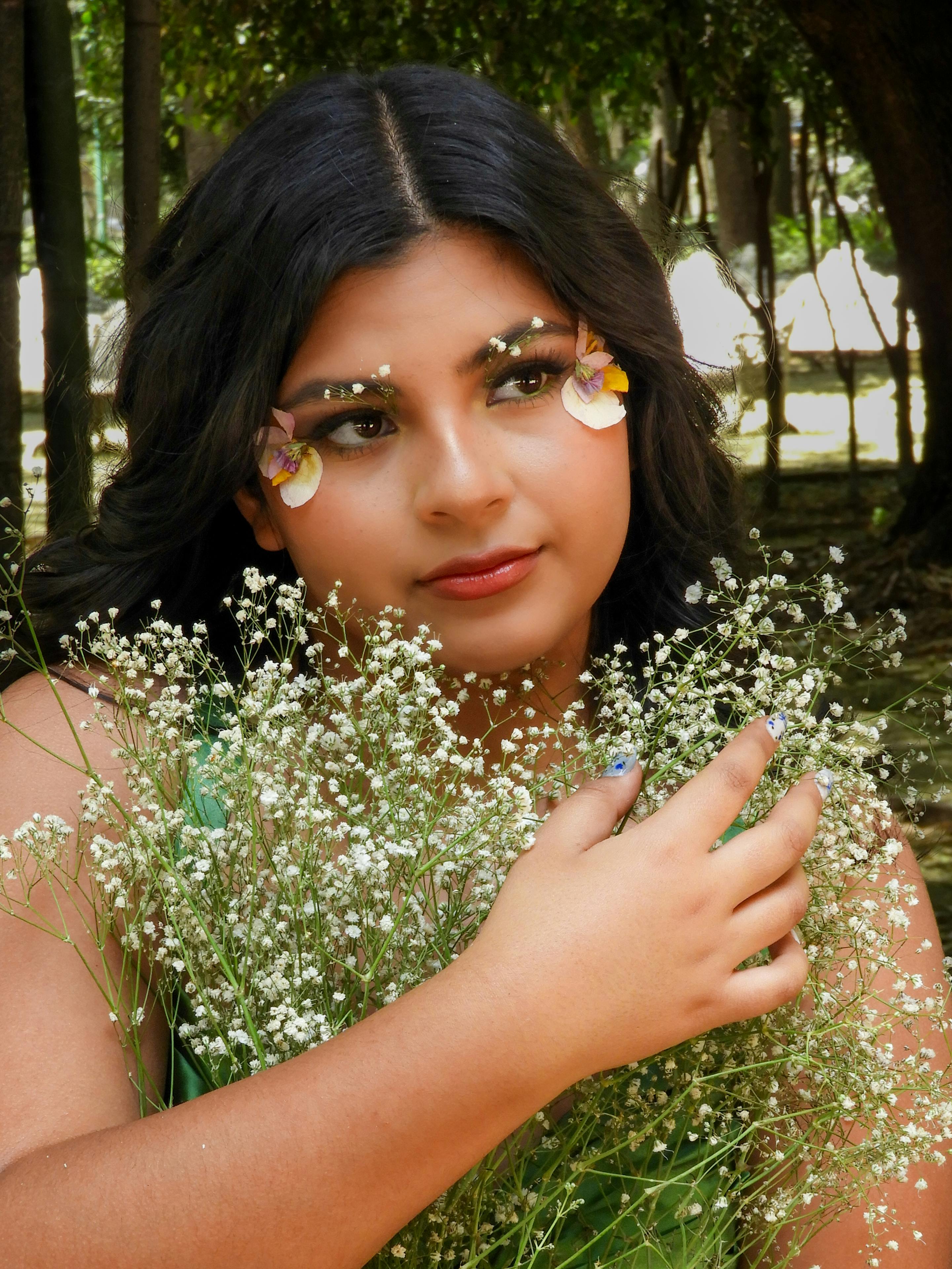 Mexican Woman Embracing Springtime Beauty with Flowers · Free Stock Photo
