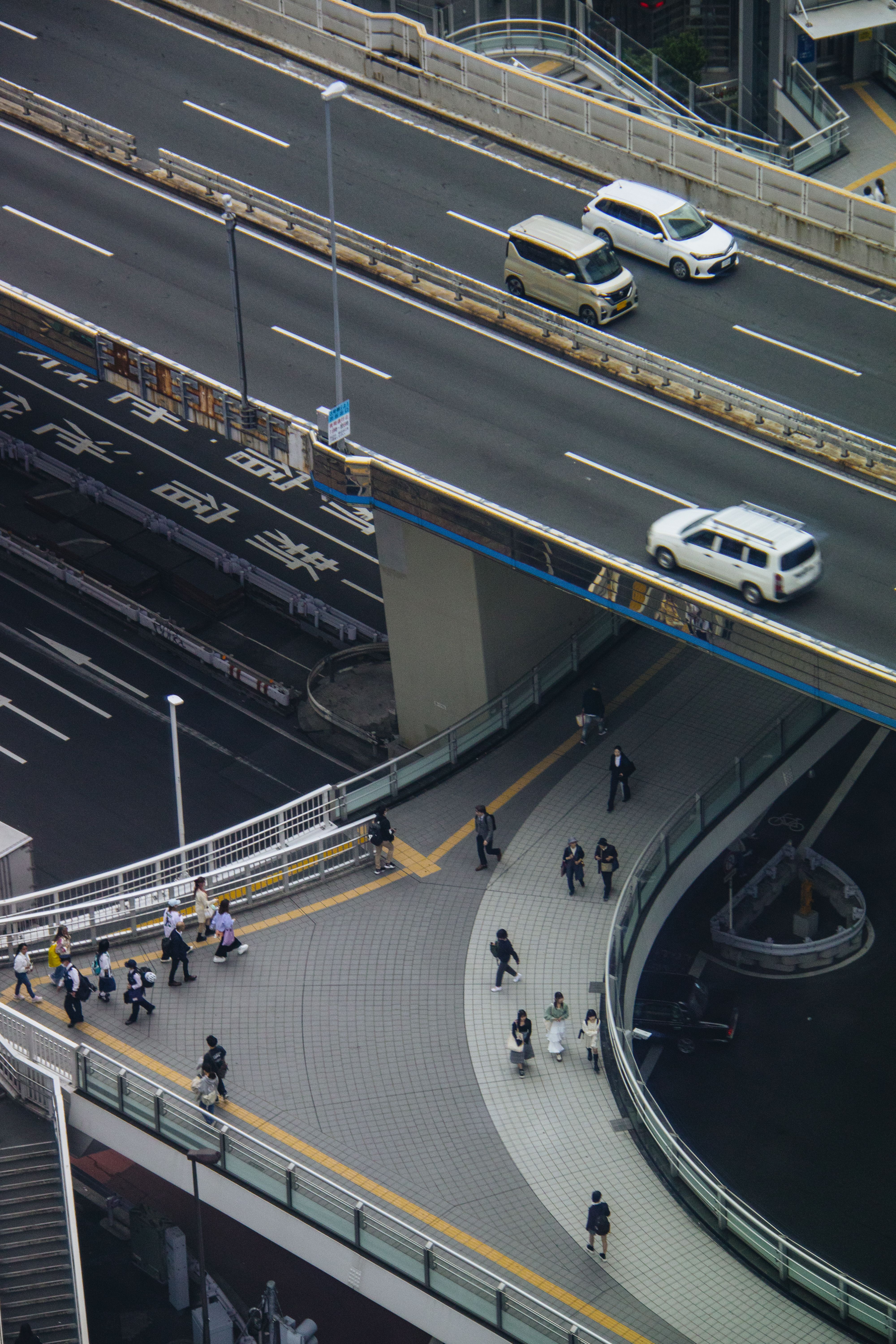 Aerial View of Busy Tokyo Highway and Pedestrian Walkway · Free Stock Photo