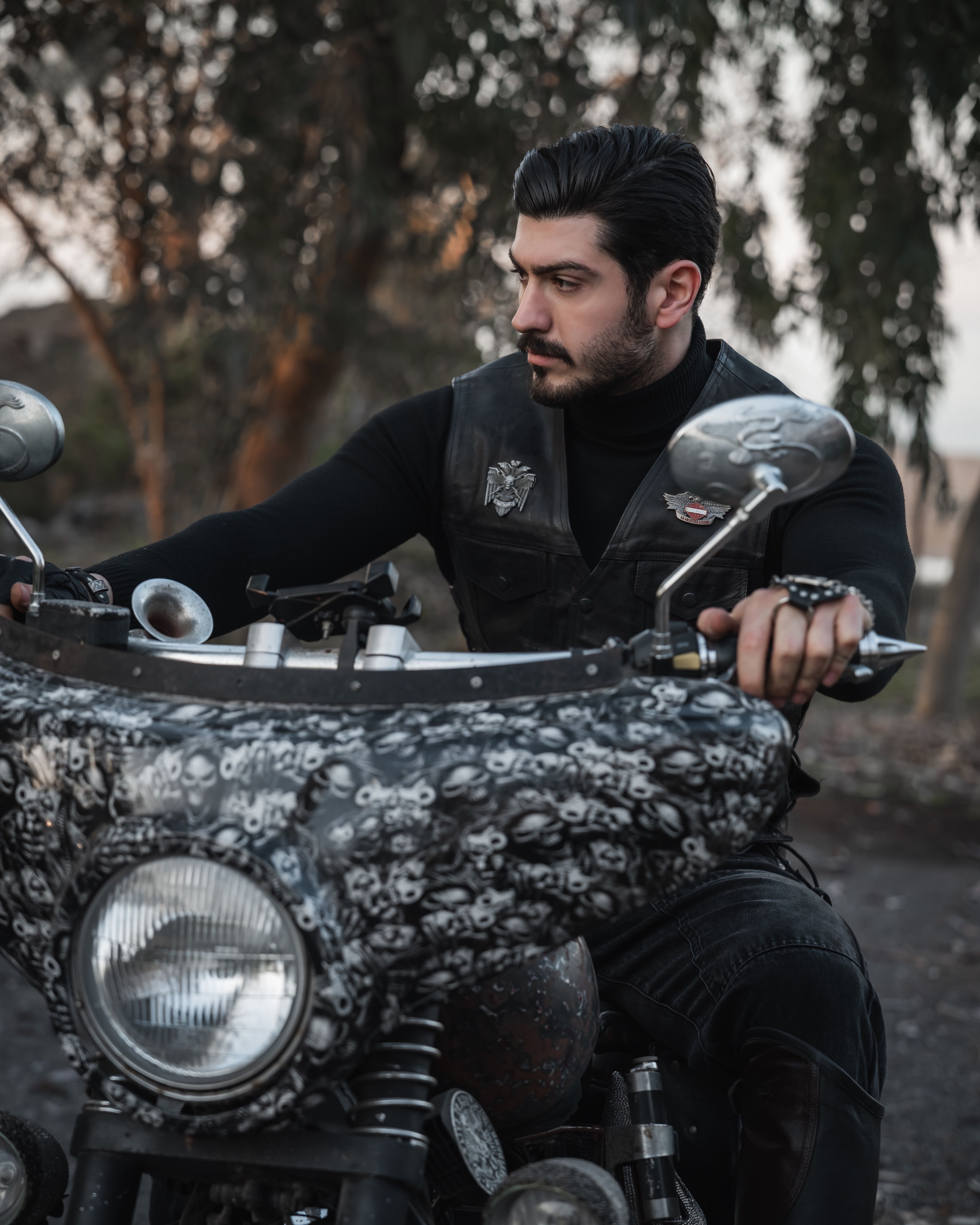 Man on Custom Motorcycle in Outdoor Setting · Free Stock Photo