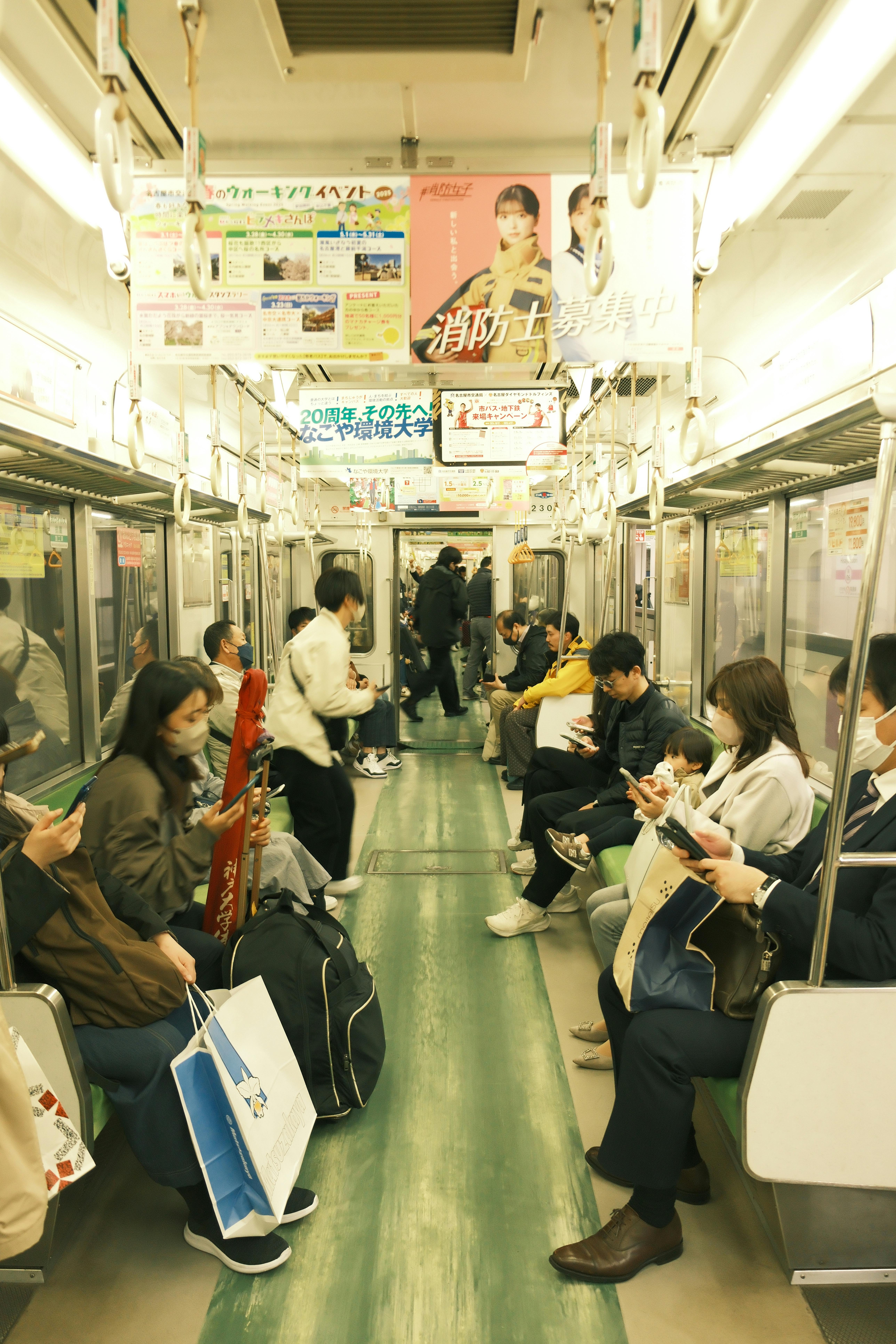 Busy Commuters on a Tokyo Subway Train · Free Stock Photo
