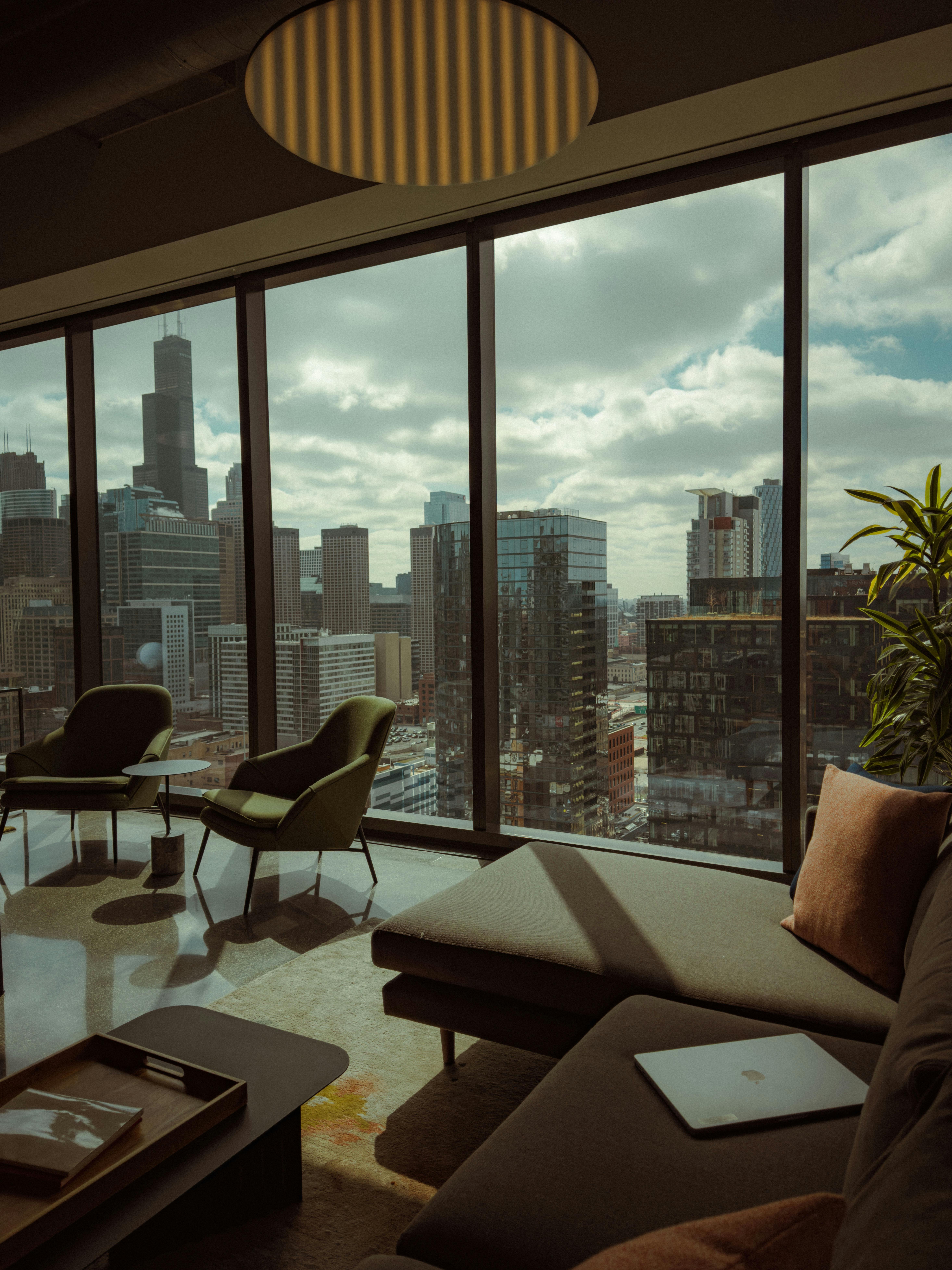 Modern Office Lounge Overlooking Chicago Skyline · Free Stock Photo
