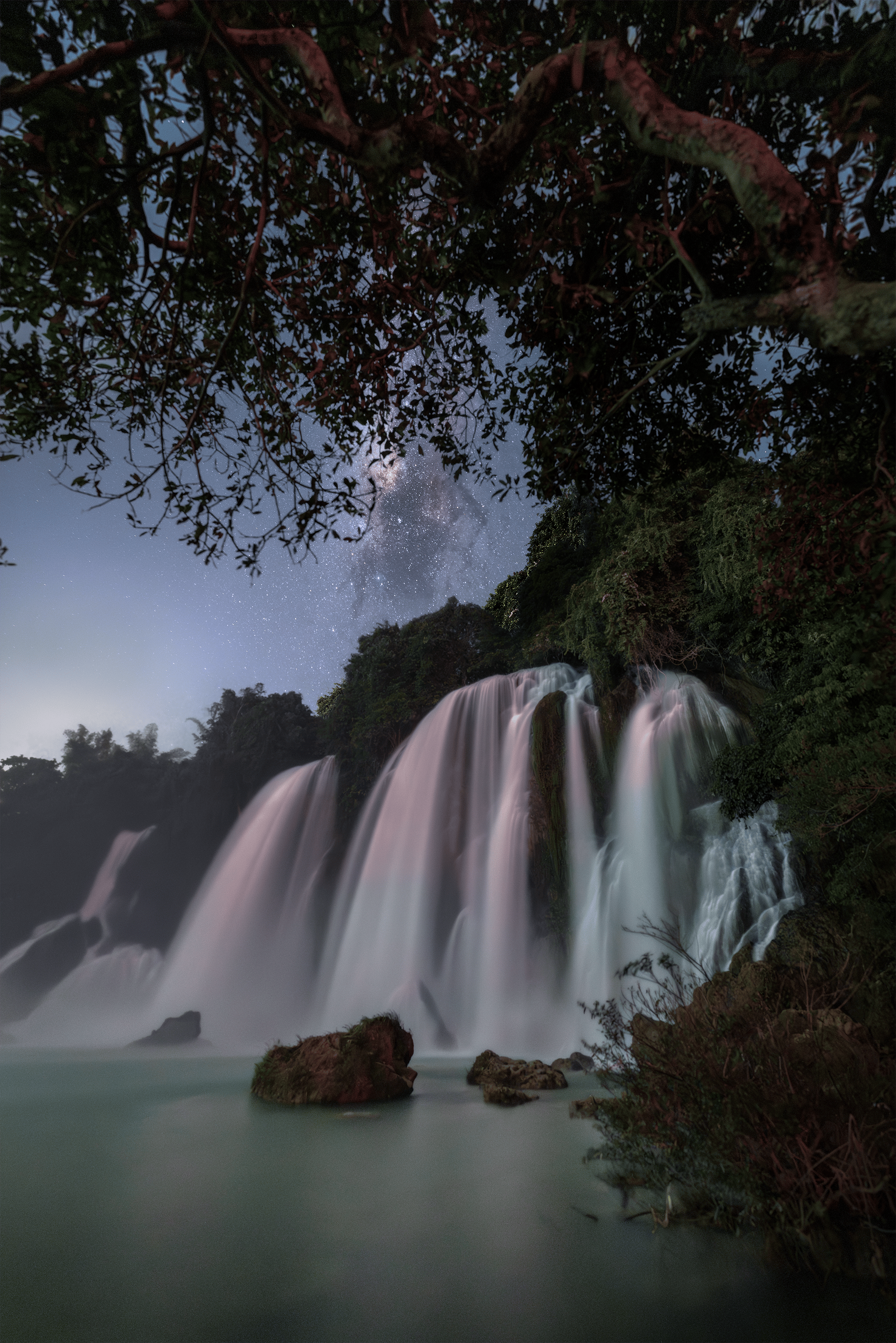 Stunning Night Waterfall Under Starry Sky · Free Stock Photo