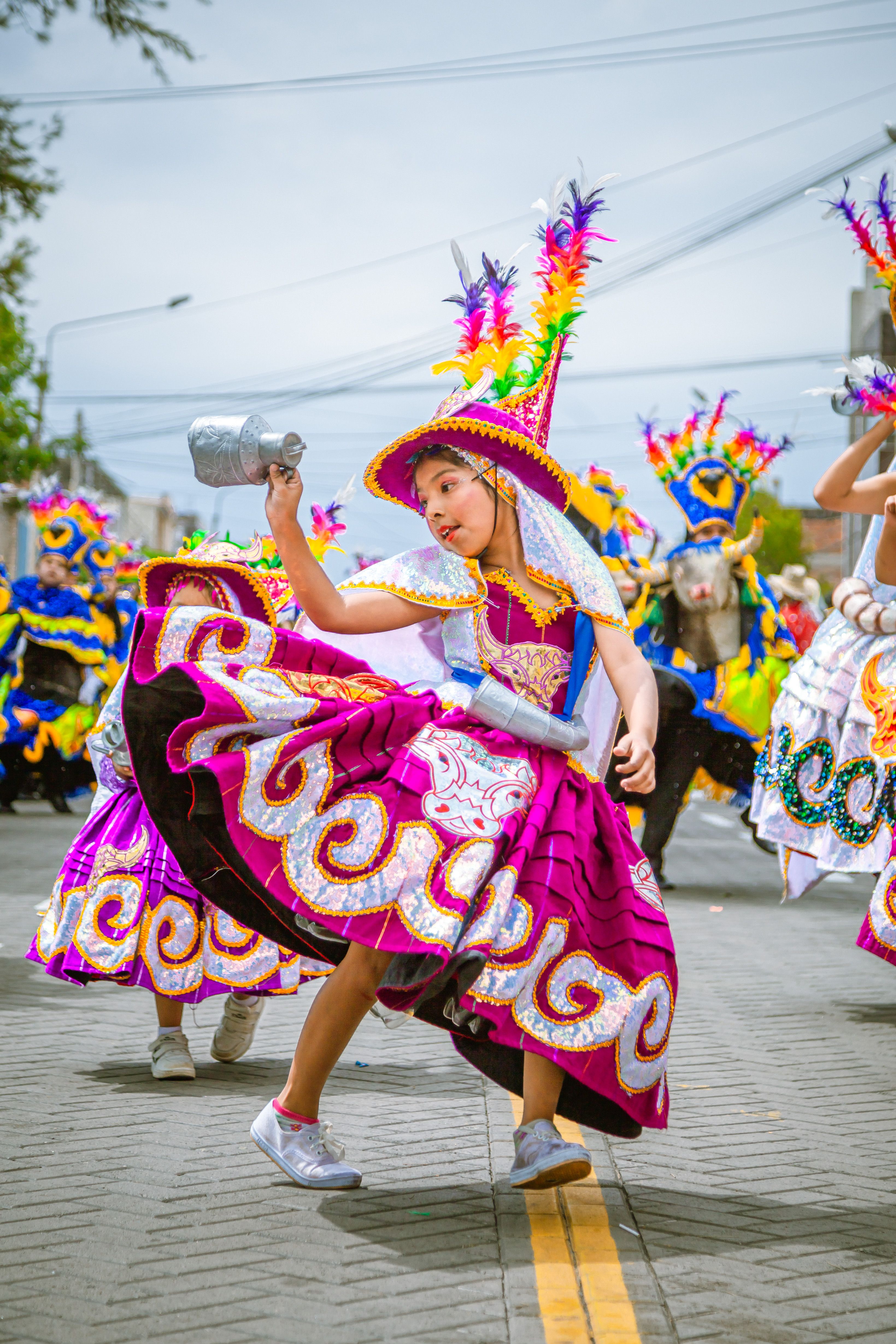 Vibrant Traditional Dance Parade Street Performance · Free Stock Photo