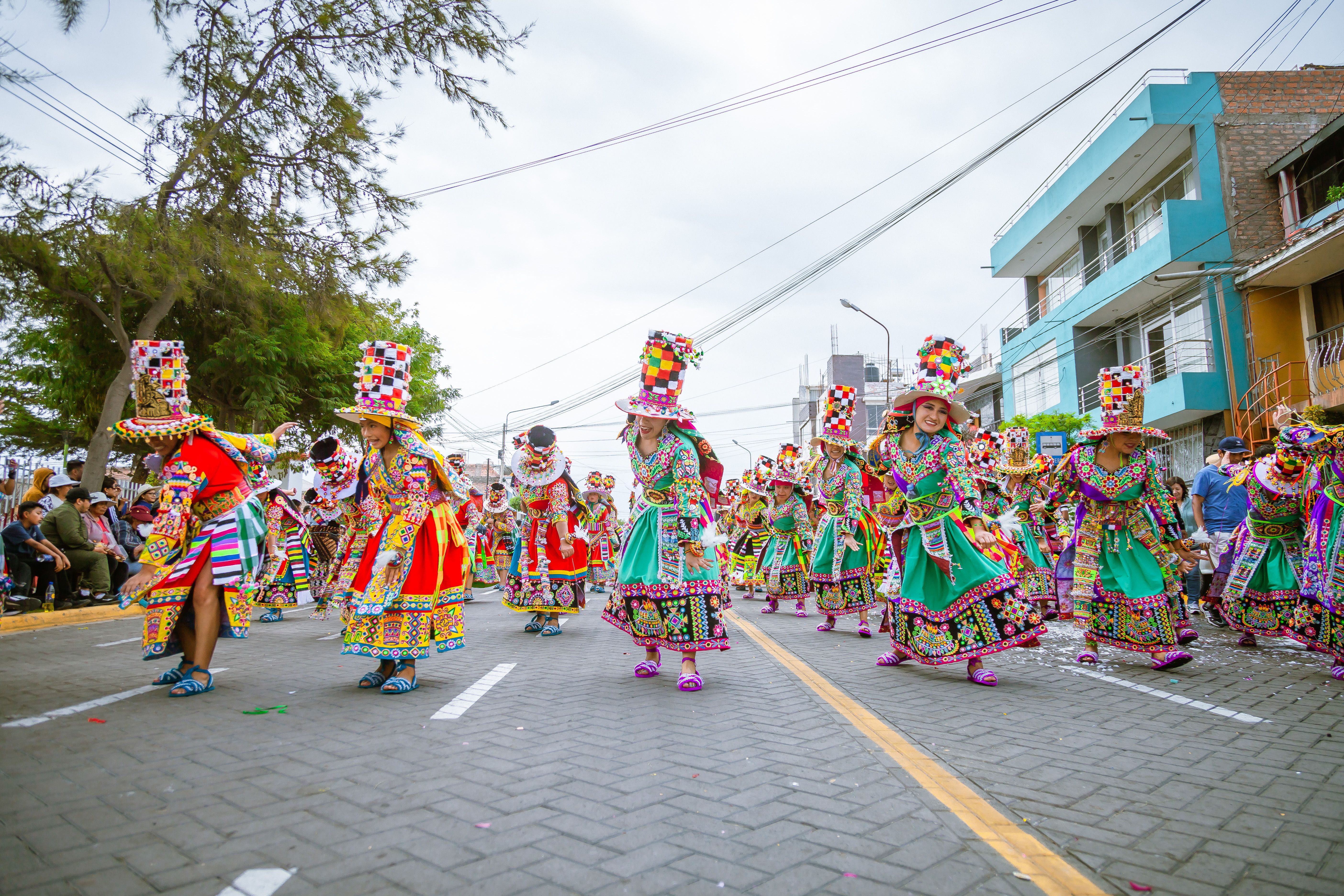 Colorful Traditional Parade with Dancers Outdoors · Free Stock Photo