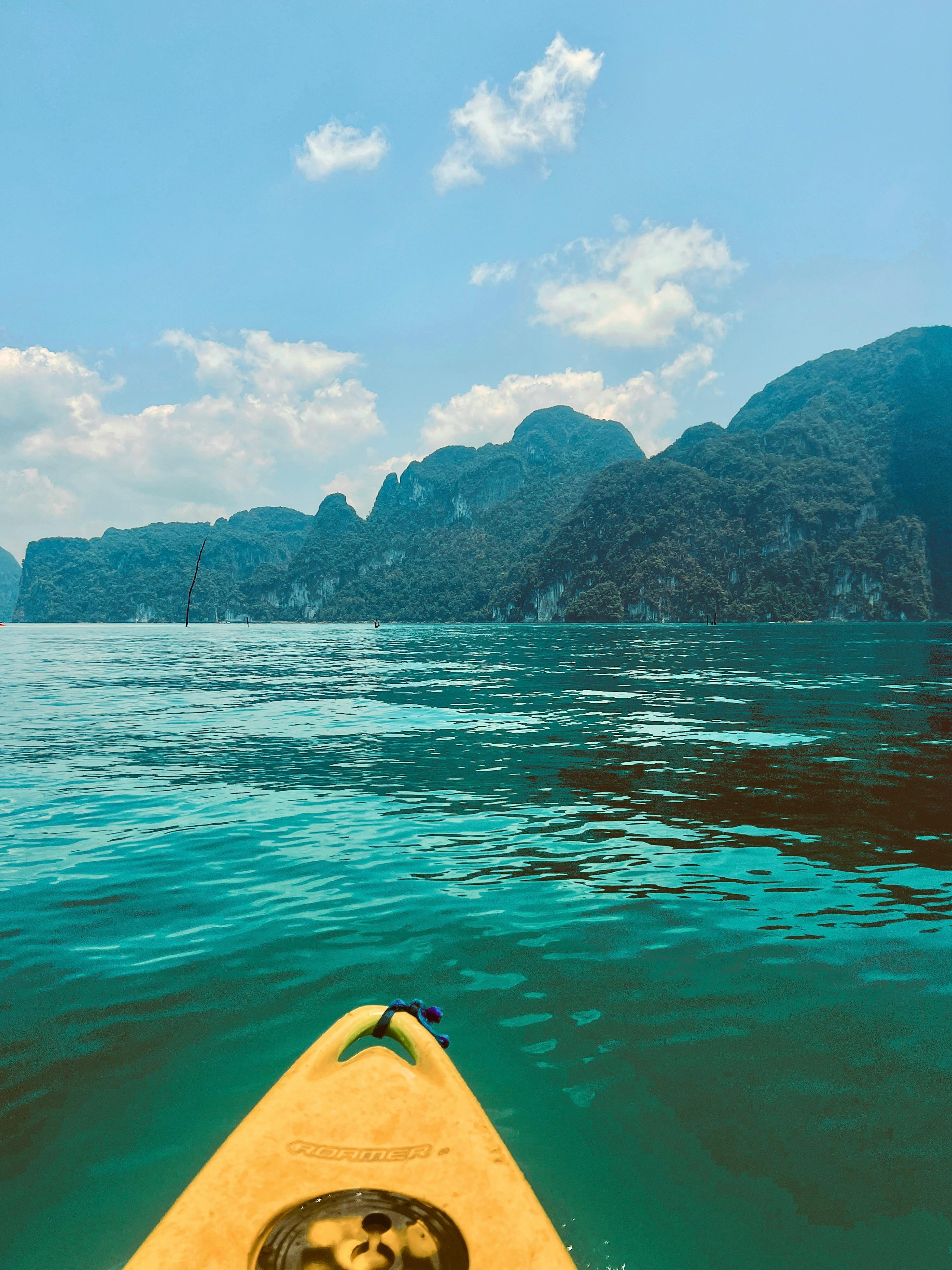 Kayaking Adventure on Clear Turquoise Waters · Free Stock Photo