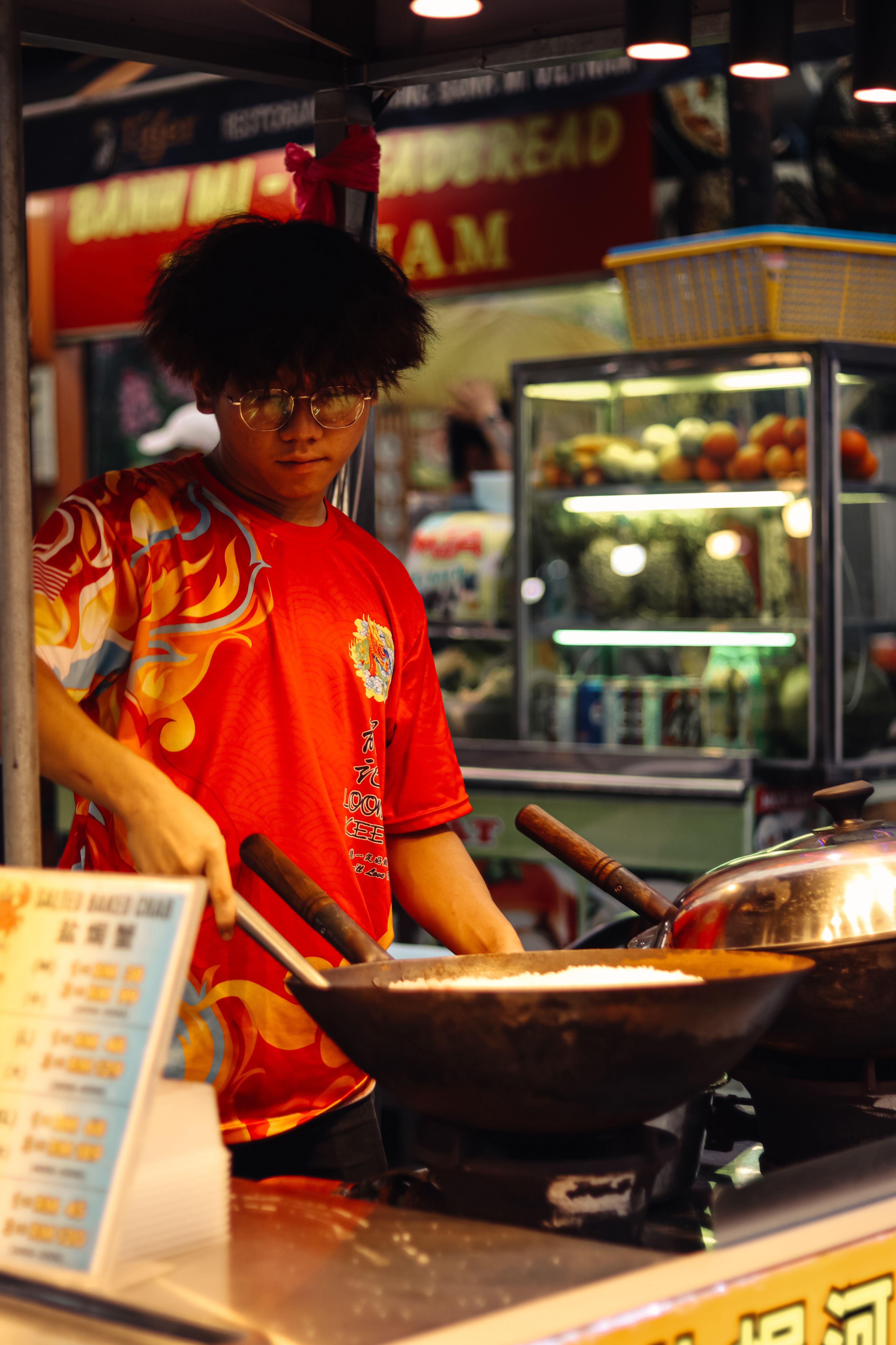 Street Food Vendor Cooking in Kuala Lumpur · Free Stock Photo
