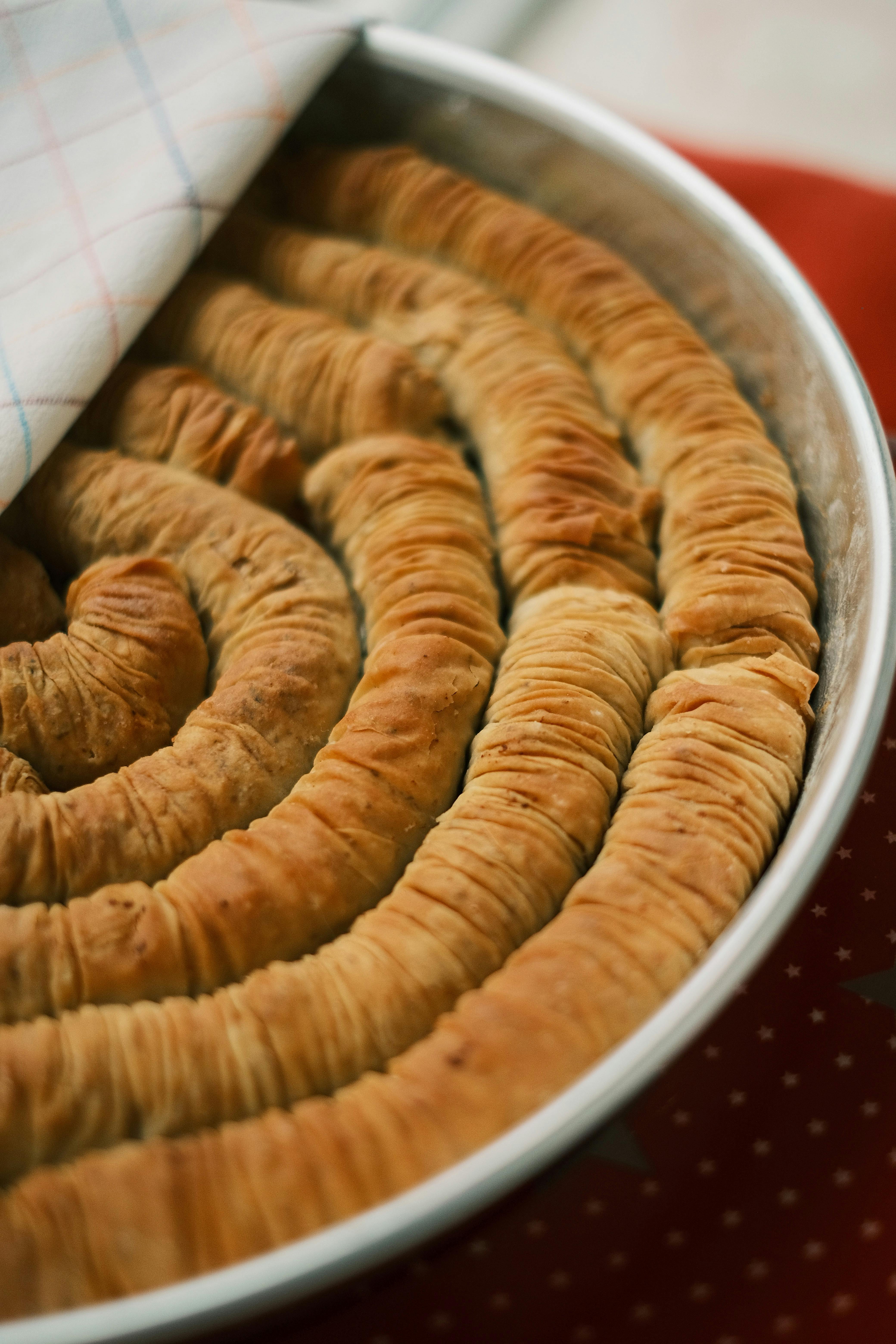 Close-up of Traditional Rolled Pastry Dish · Free Stock Photo