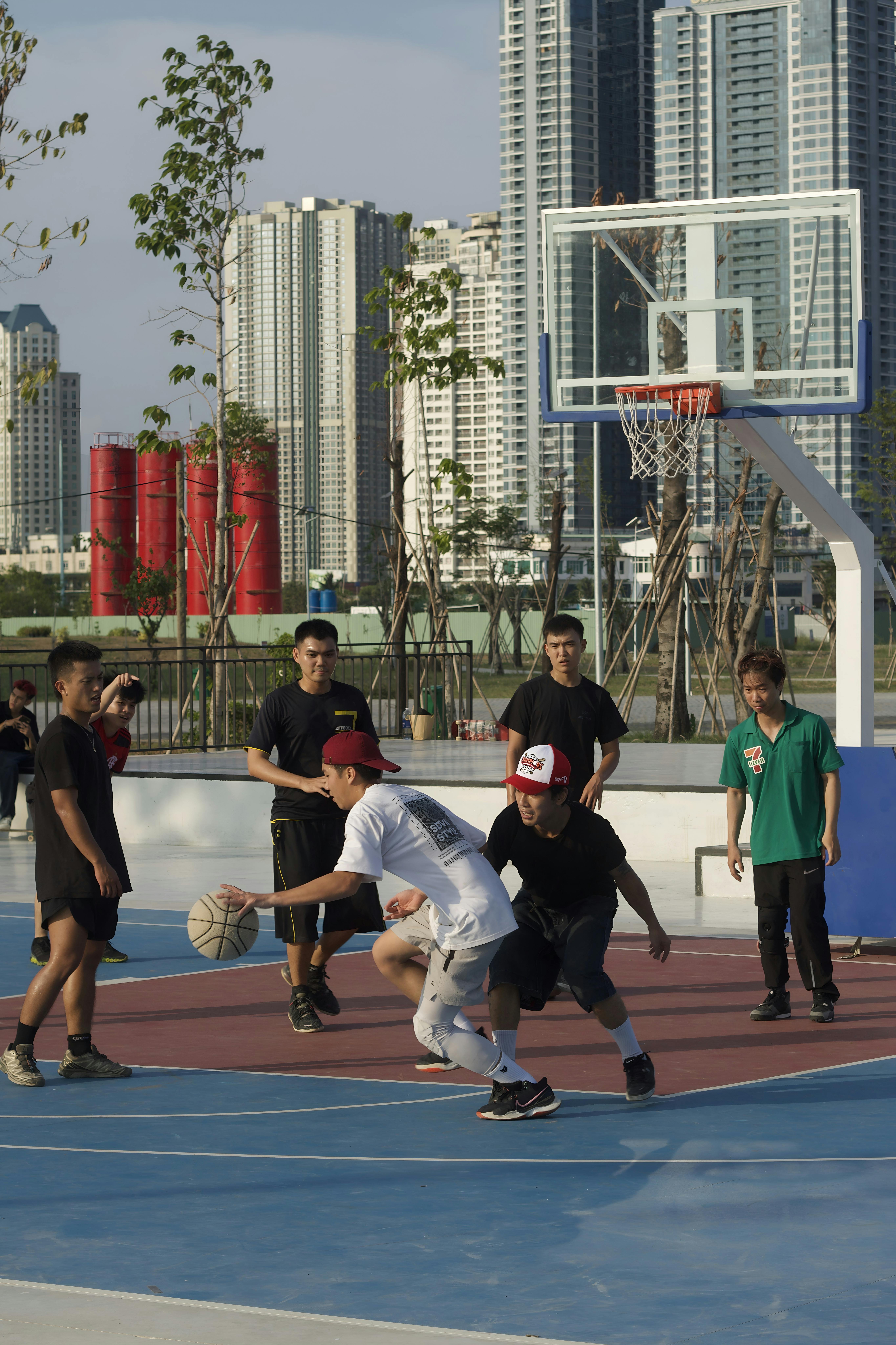 Street Basketball Game in Urban Vietnam Setting · Free Stock Photo