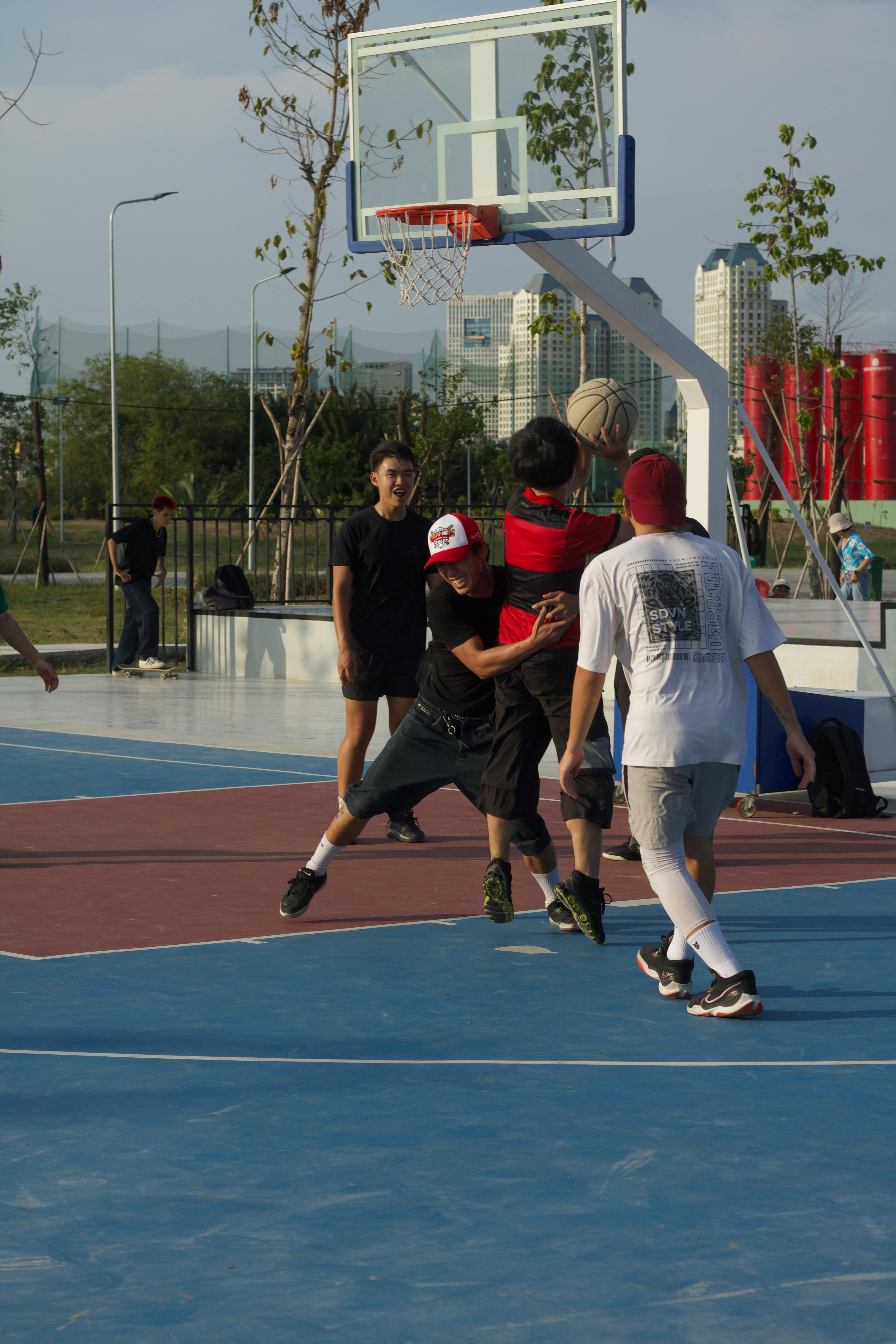 Outdoor Street Basketball Game in Saigon · Free Stock Photo