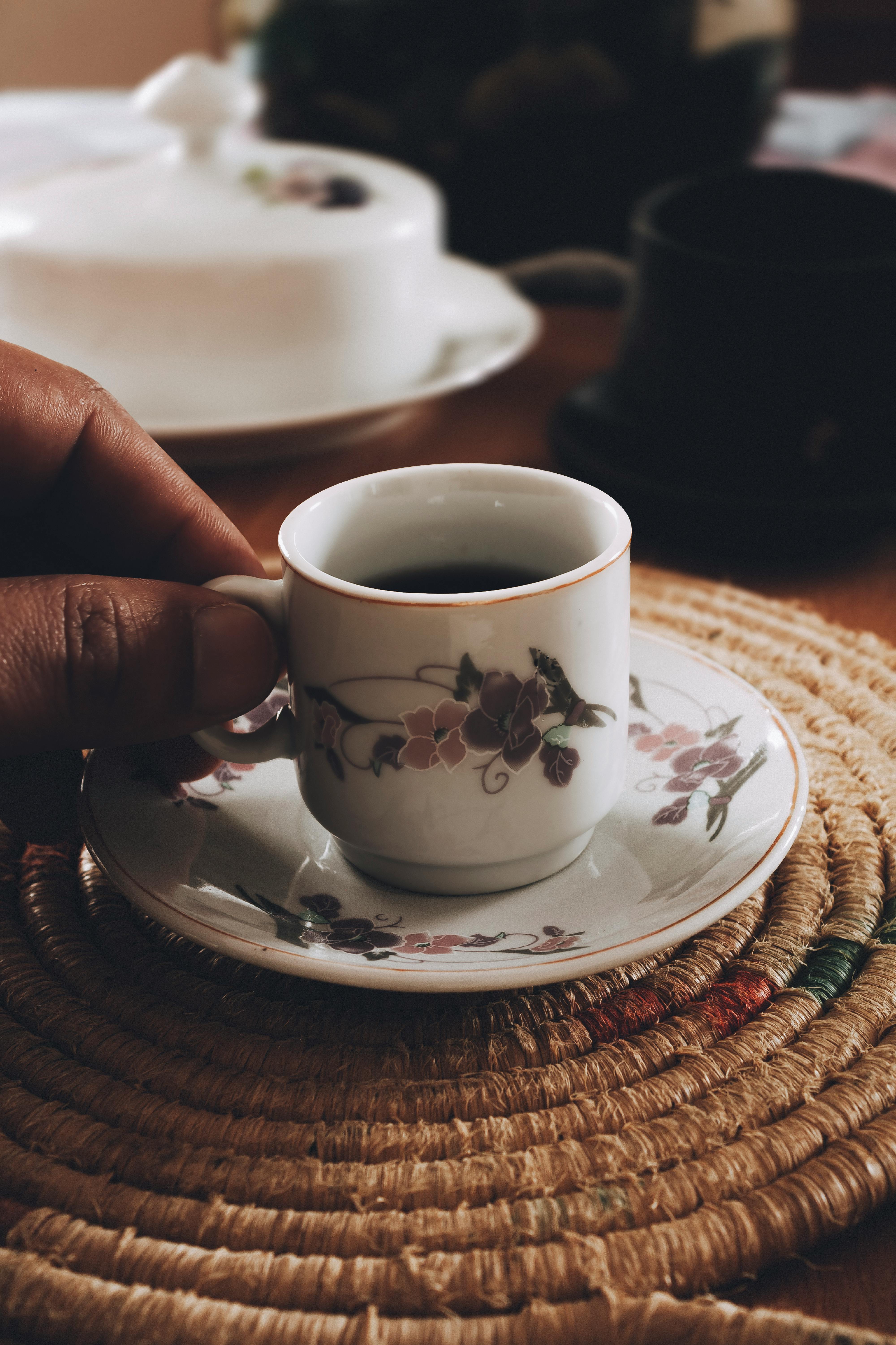 Cozy Morning Coffee Ritual with Floral Cup · Free Stock Photo