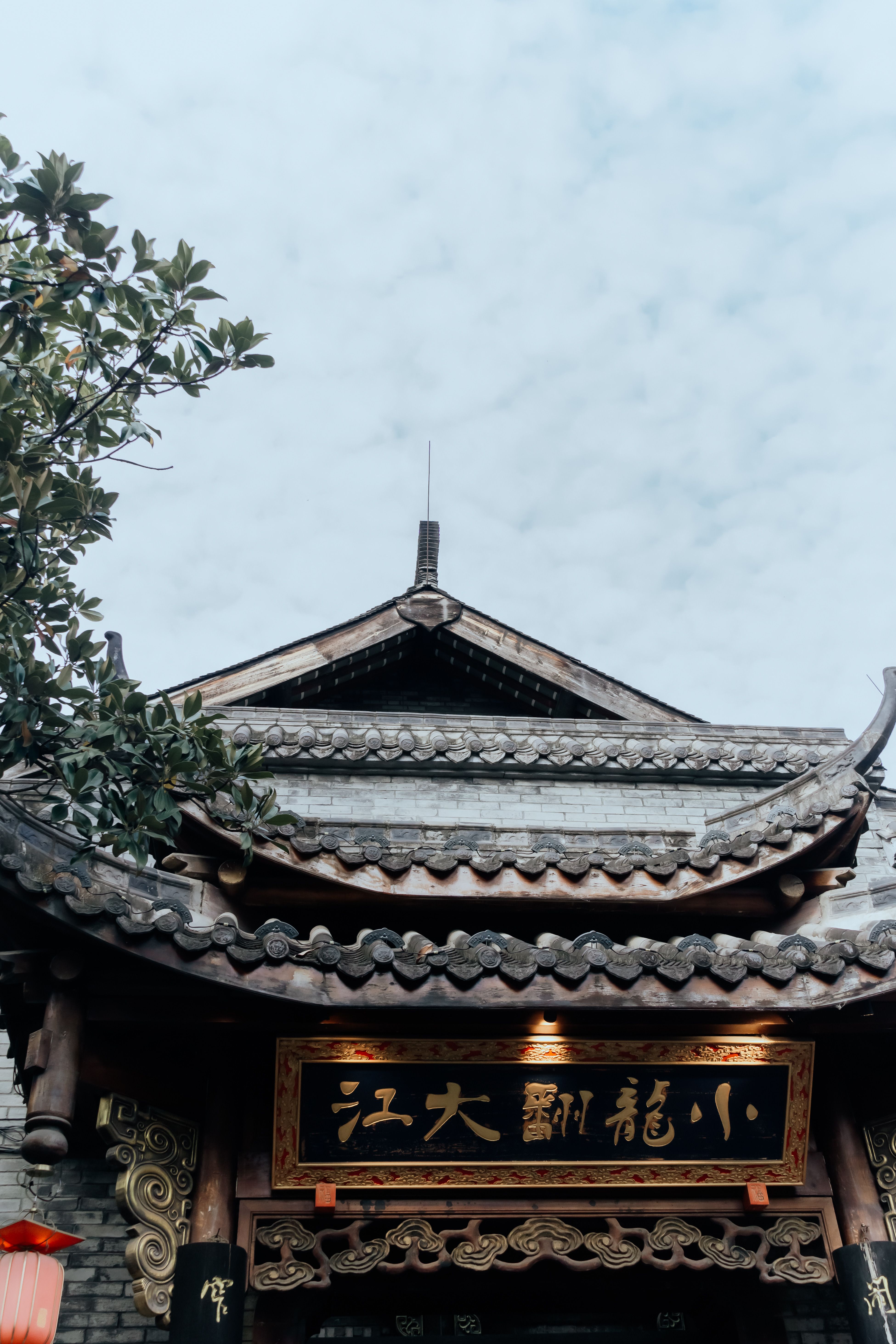 Traditional Chinese Roof Against Blue Sky · Free Stock Photo