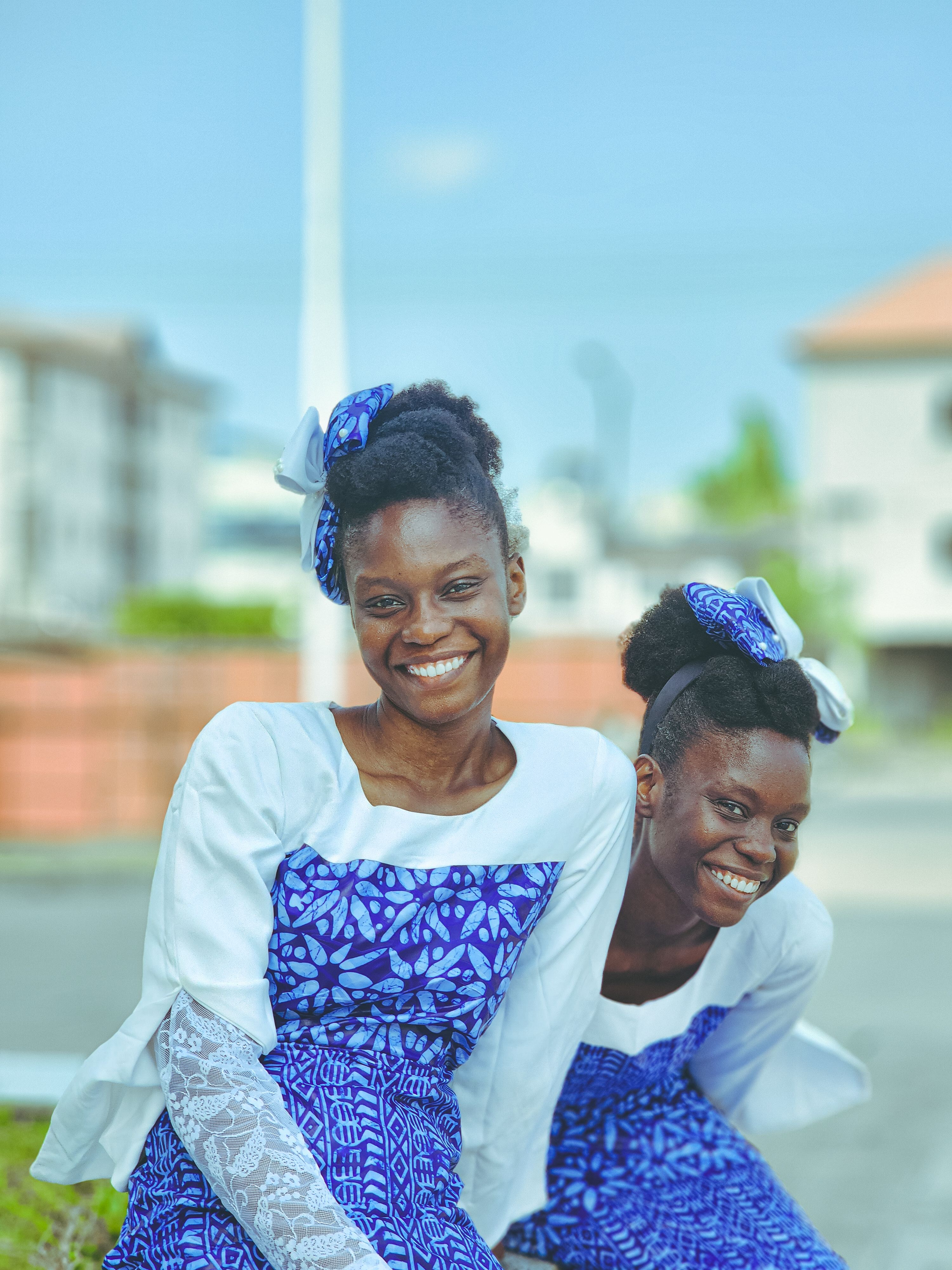 Smiling Friends in Traditional African Attire · Free Stock Photo