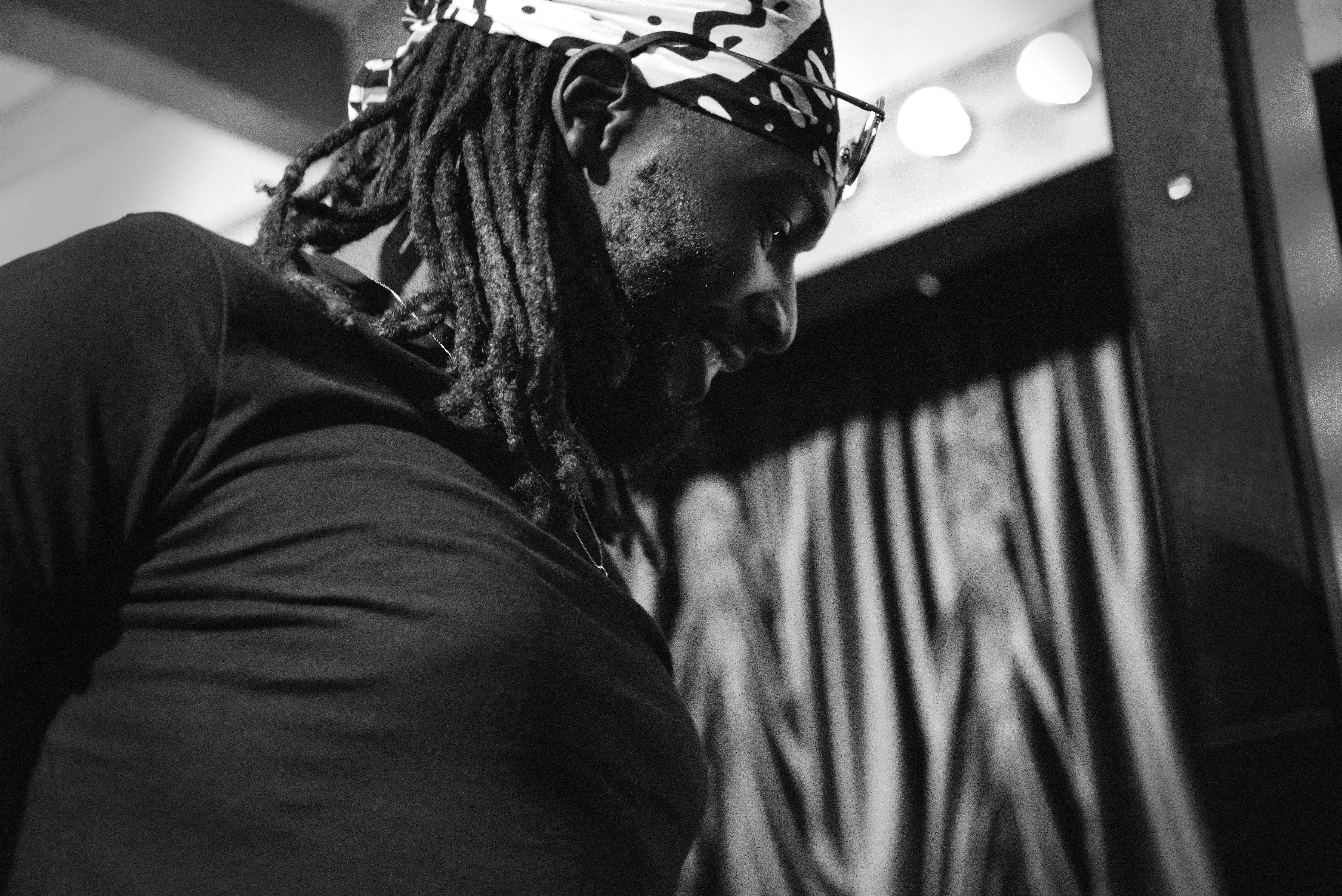 Black and White Portrait of Musician with Dreadlocks · Free Stock Photo