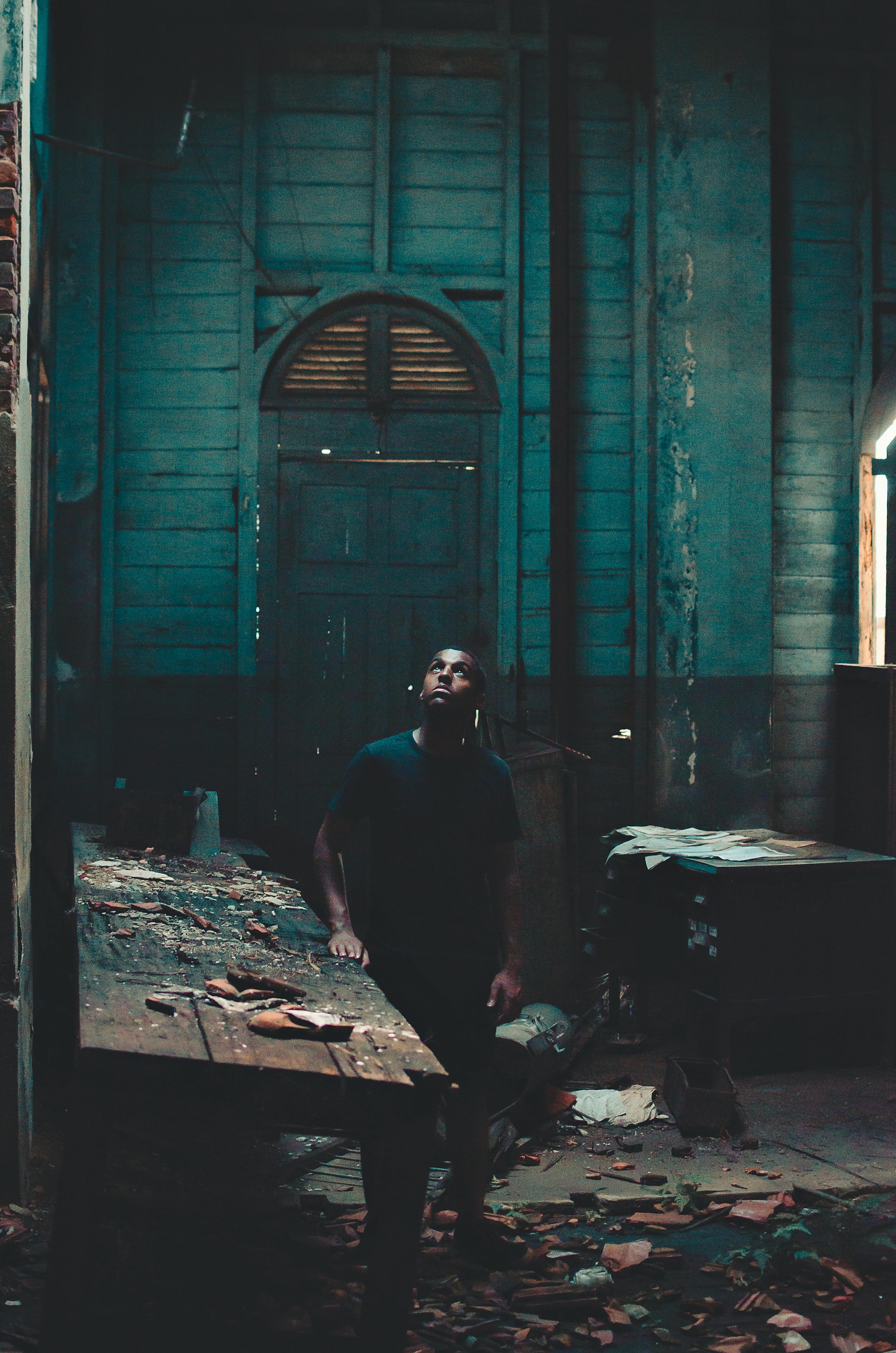 Man Holding Desk Fan · Free Stock Photo