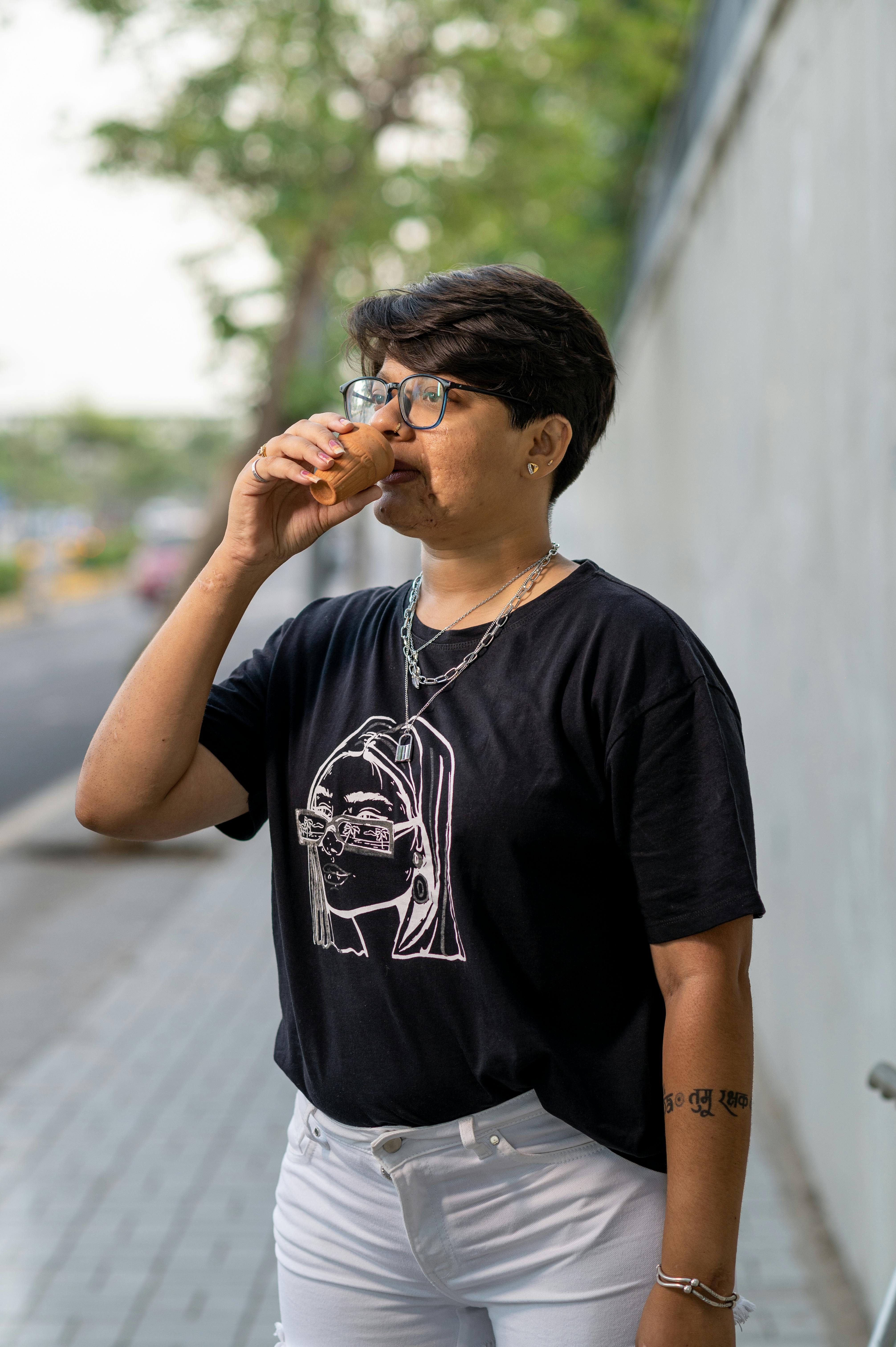 Young Woman Enjoying Street Chai in India · Free Stock Photo