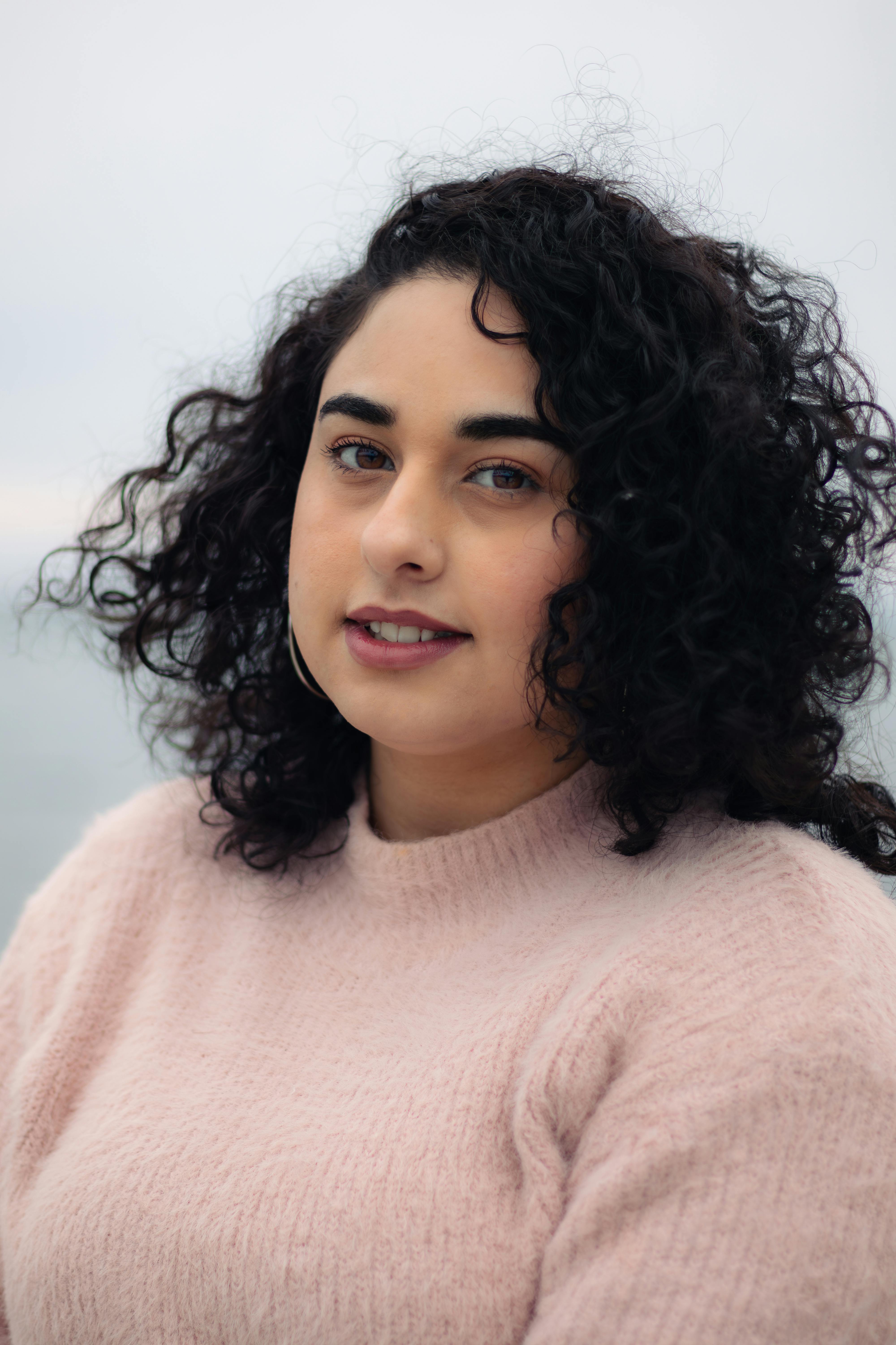 Portrait of a Woman in Toronto with Curly Hair · Free Stock Photo