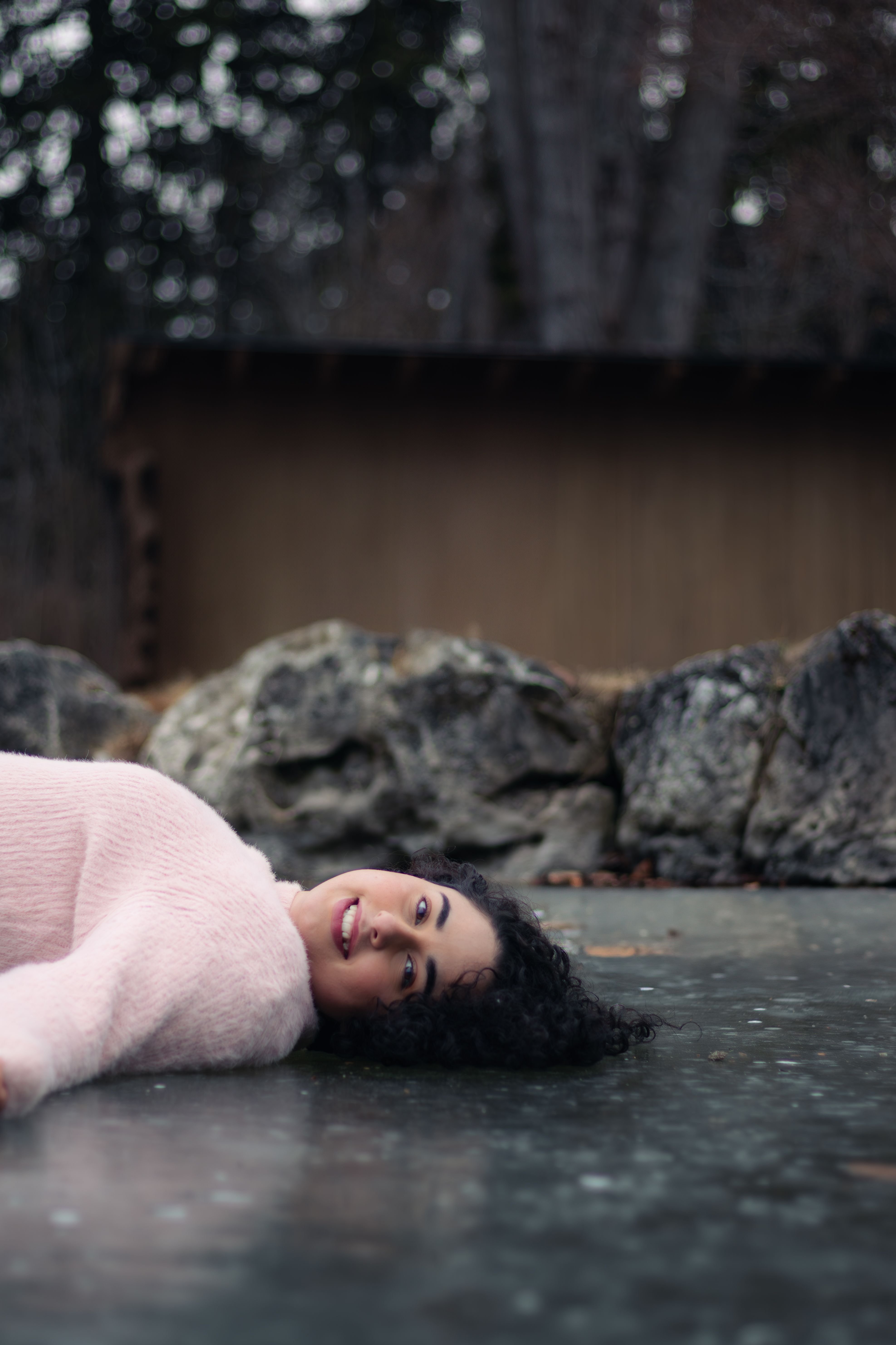 Elegant Portrait of Woman Lying on Icy Ground · Free Stock Photo